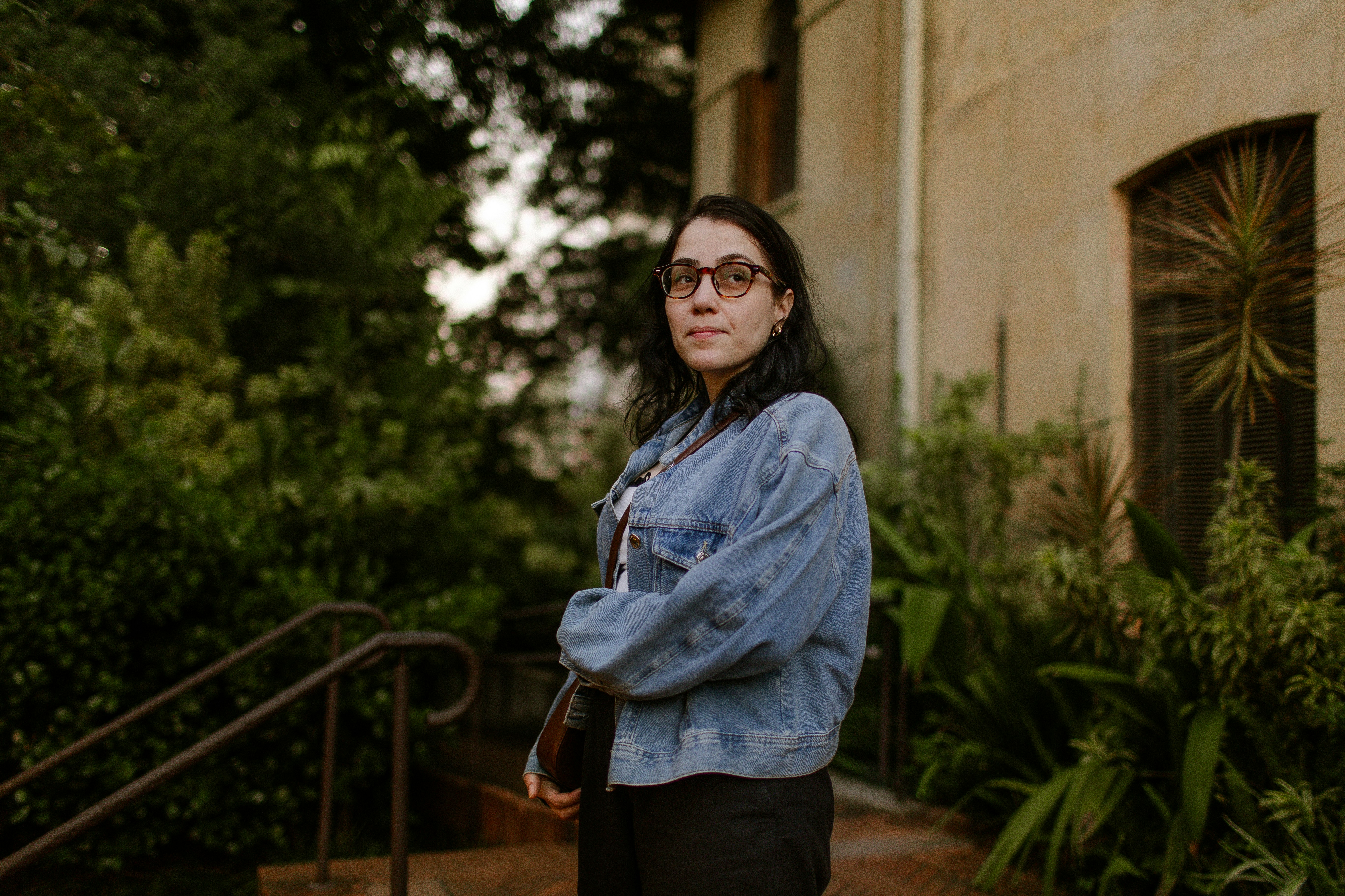 Soft Portrait Beneath an Urban Canopy