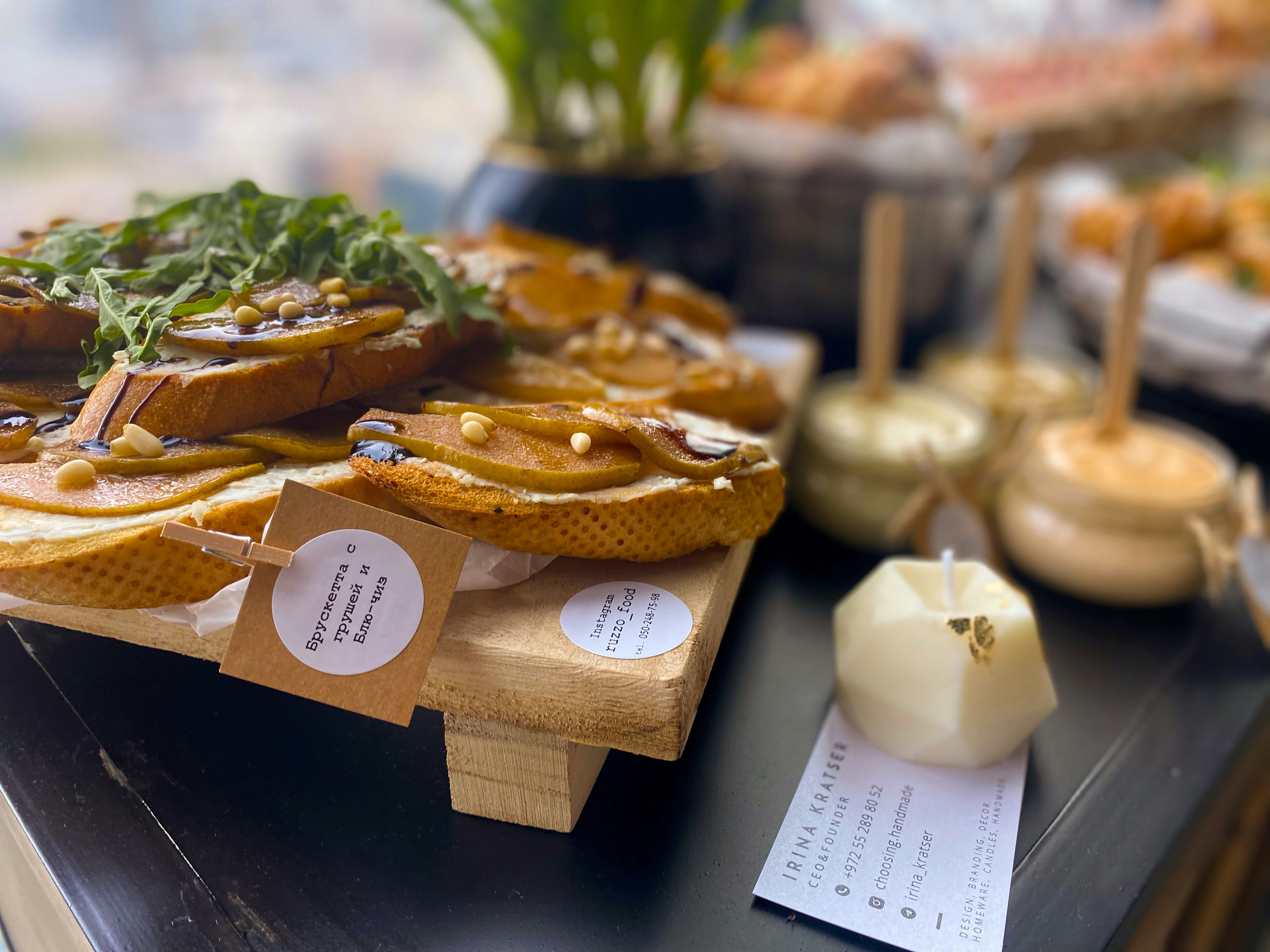 Heralded Bites: Trio of Topped Crostini on a Rustic Slate