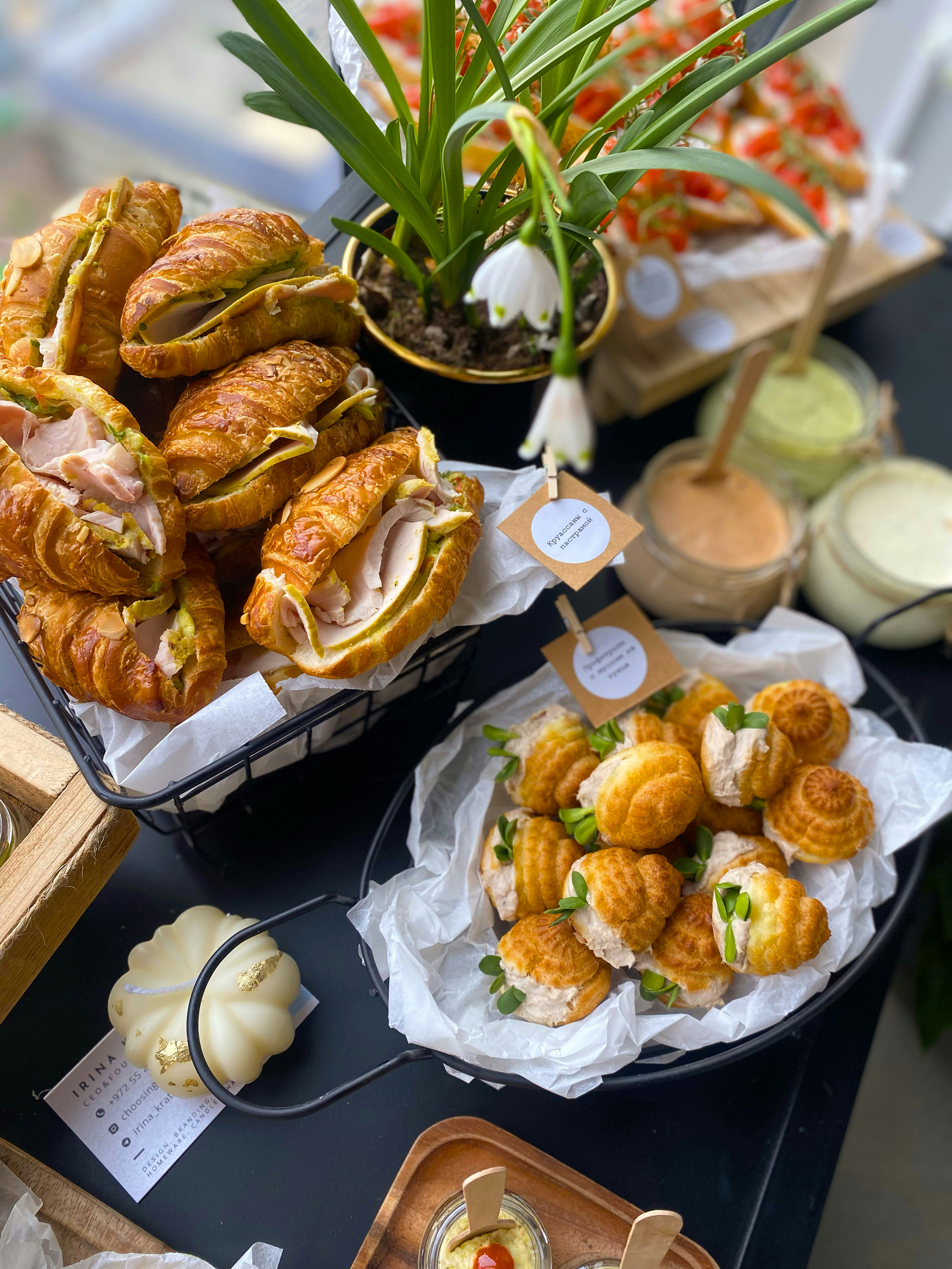 Golden Pastry Spread: Ham and cheese croissants with a garden crowd