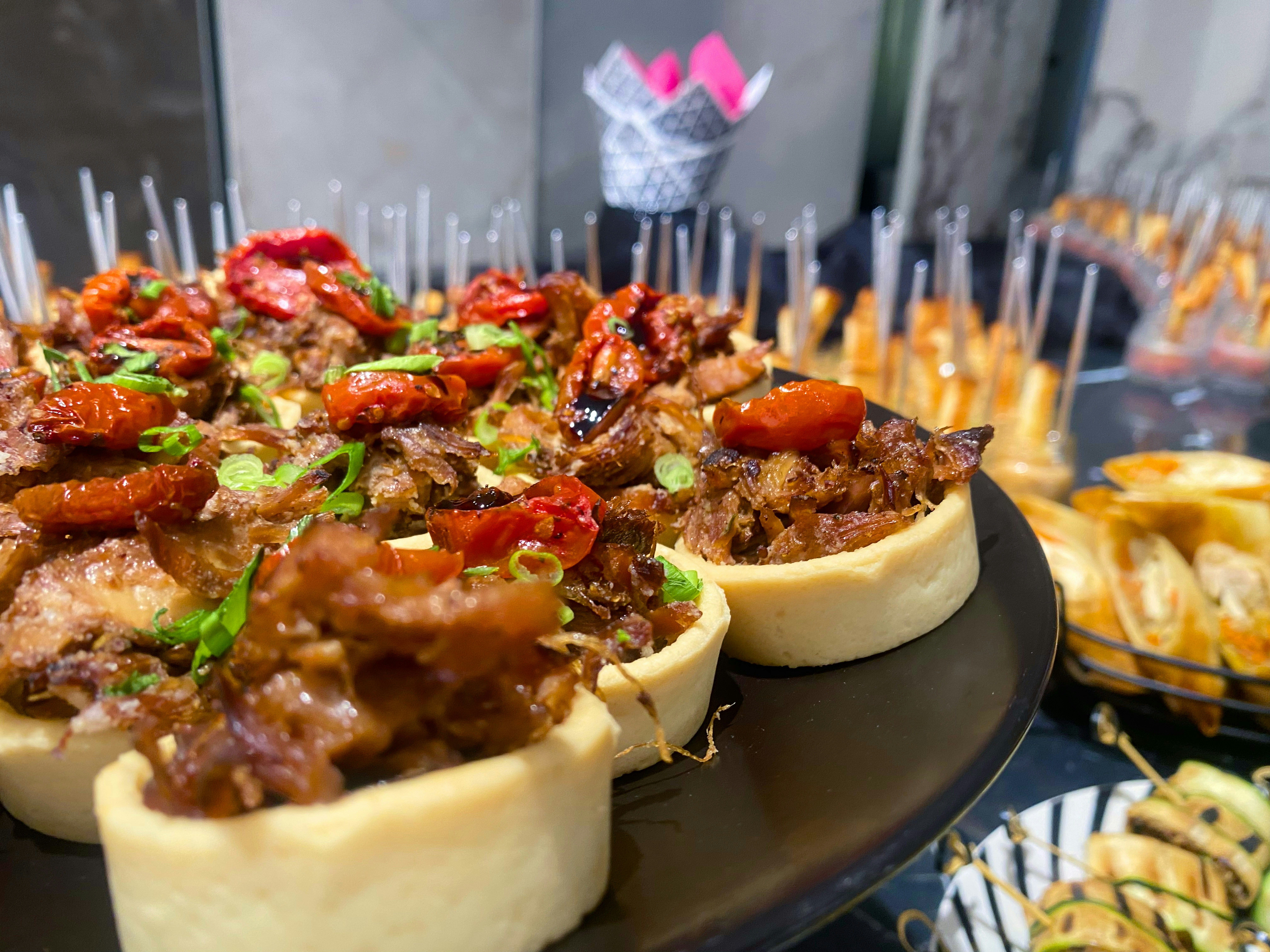 Skewered Grazing Bites: Close-Up of Tender Tostas Surrounded by Skewers
