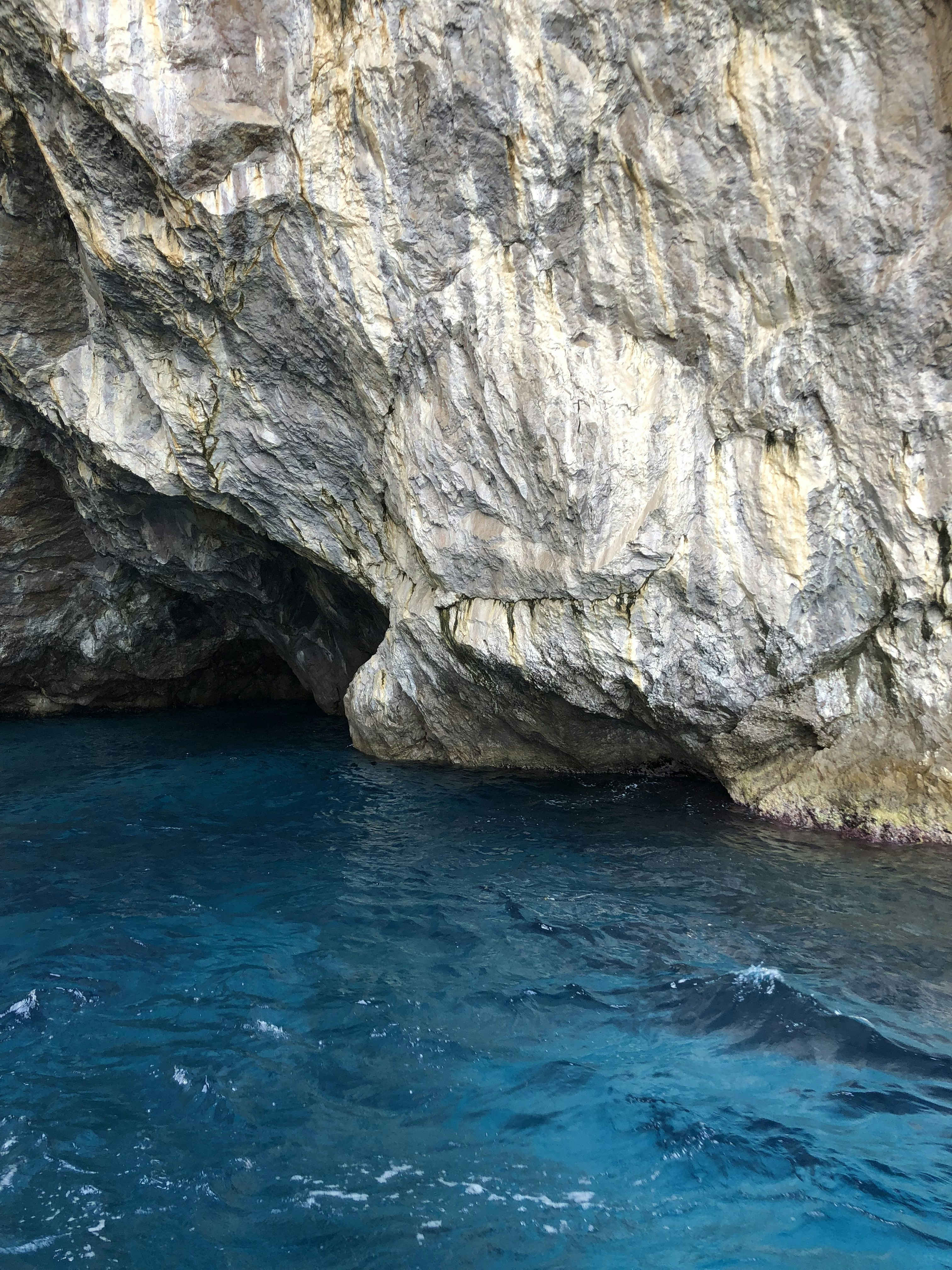 Blue Grotto Edge: Cliffside Sea Entrance