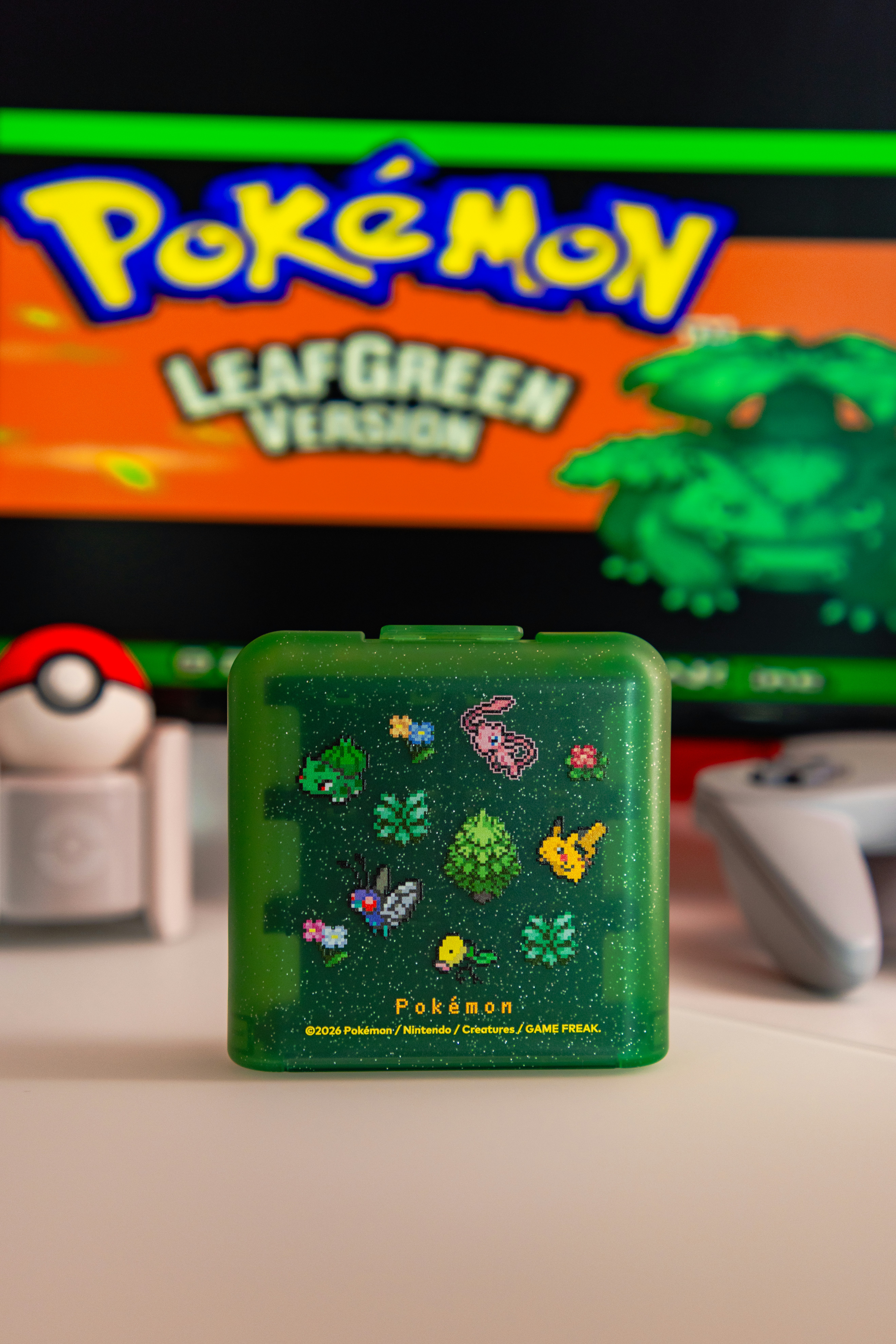 Green Pocket: A Pokémon Scene Centered on a Shiny Game Cartridge