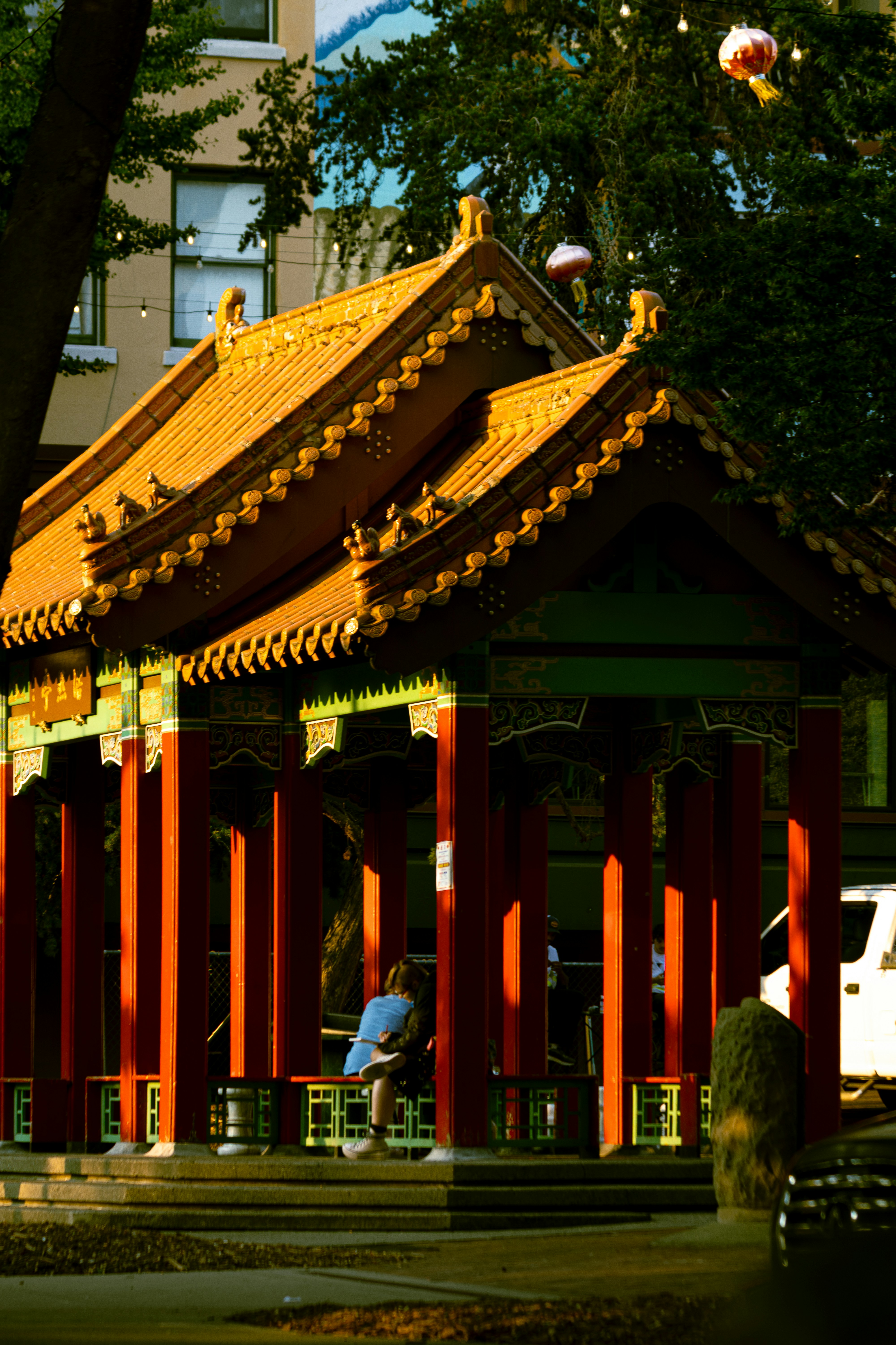 Sunlit Rooflines and Lanterns: A Temple Courtyard in Warm Autumn Light