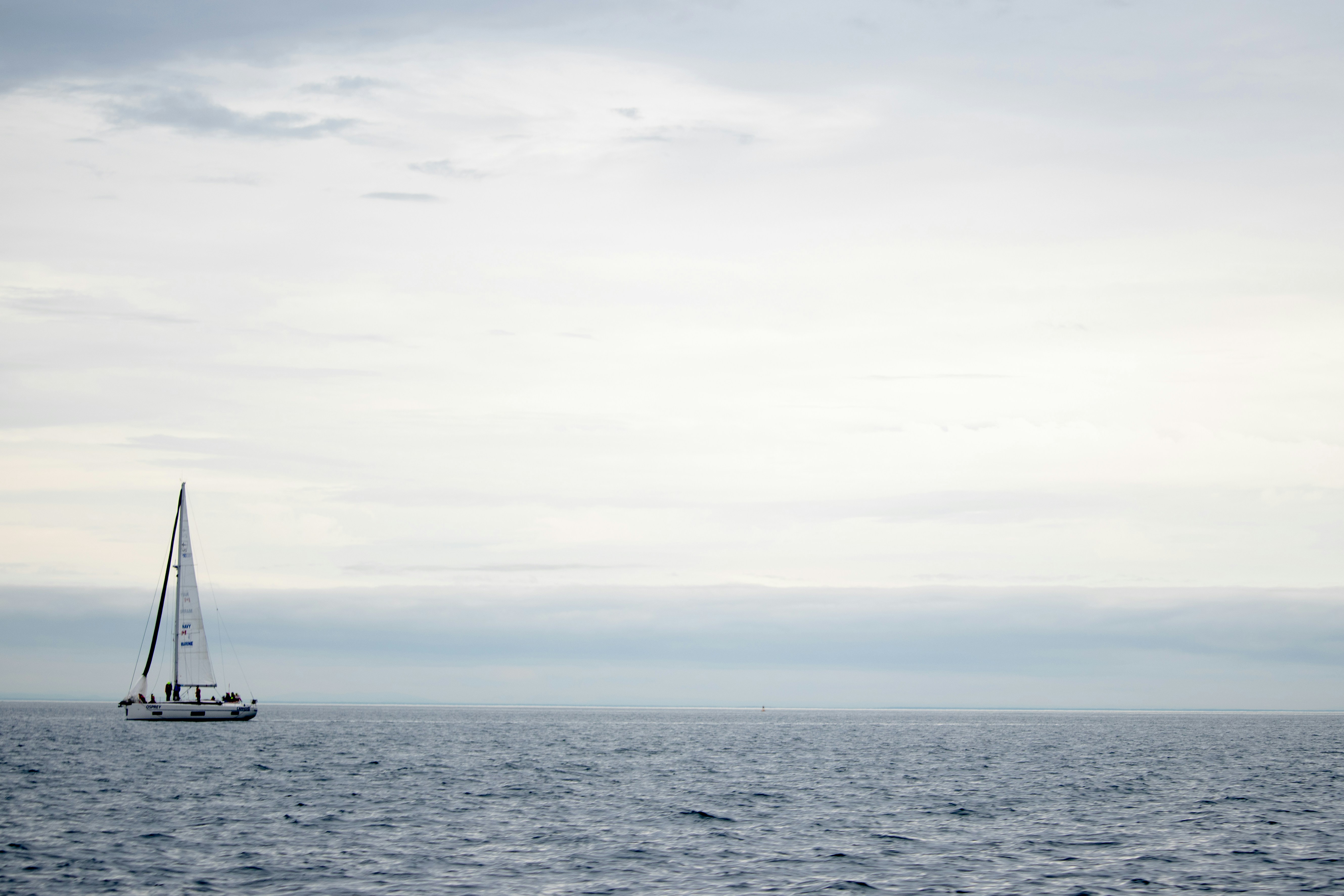 Sailboat at the Horizon: A Quiet Seascape
