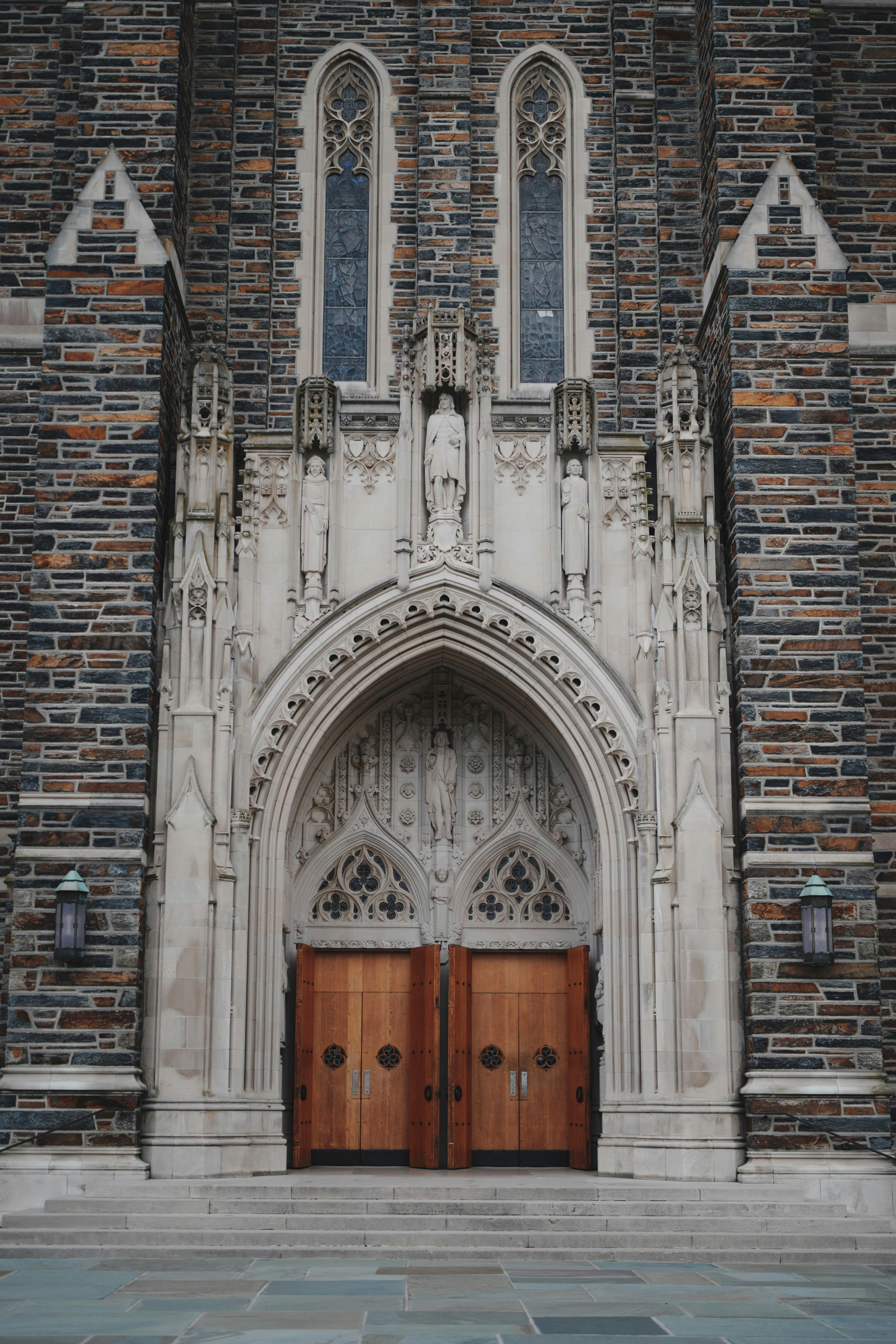 Gothic Portal in Symmetry: Carved Stone Meets Warm Timber
