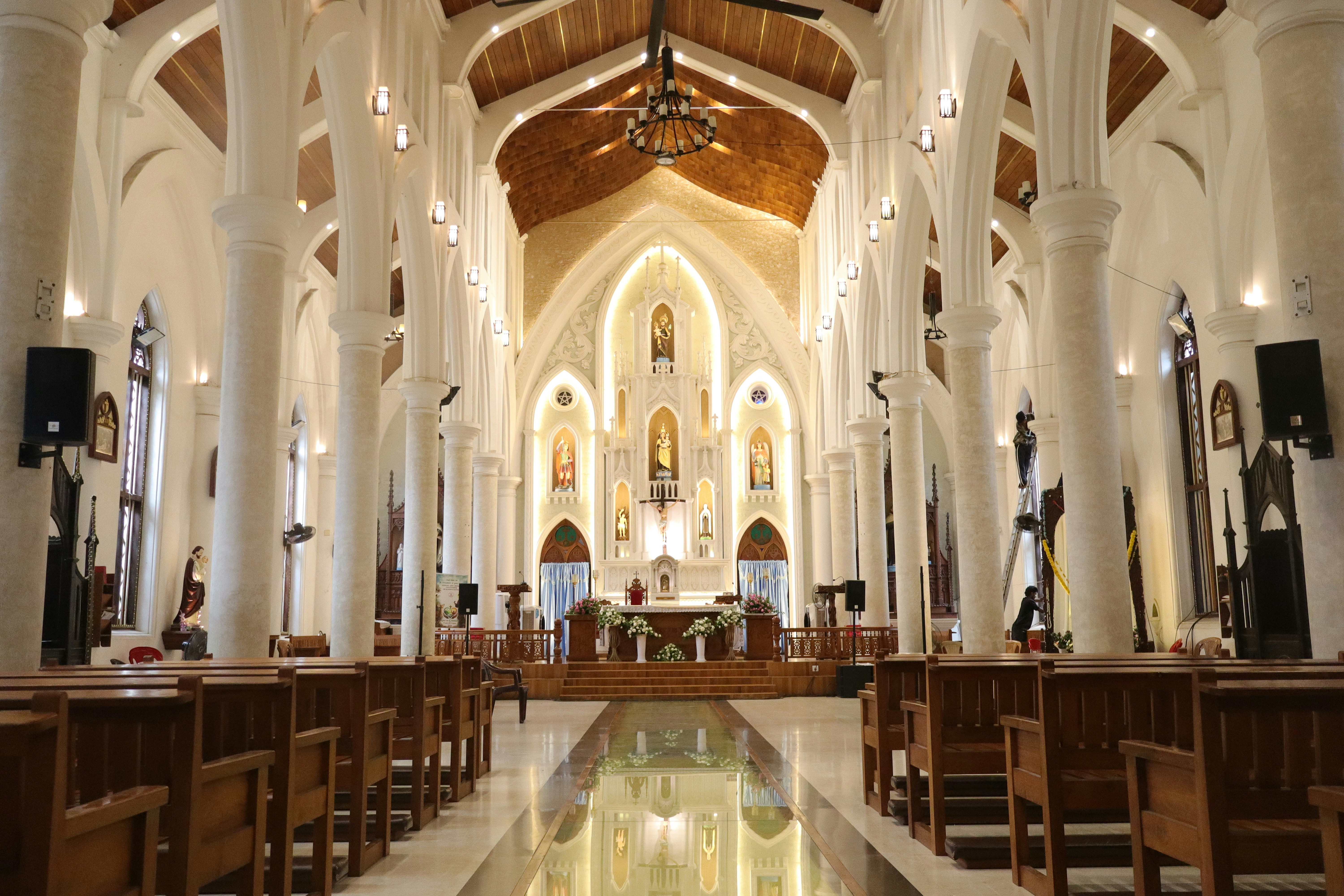 Sanctuary Cathedral: Aged arches and luminous altar