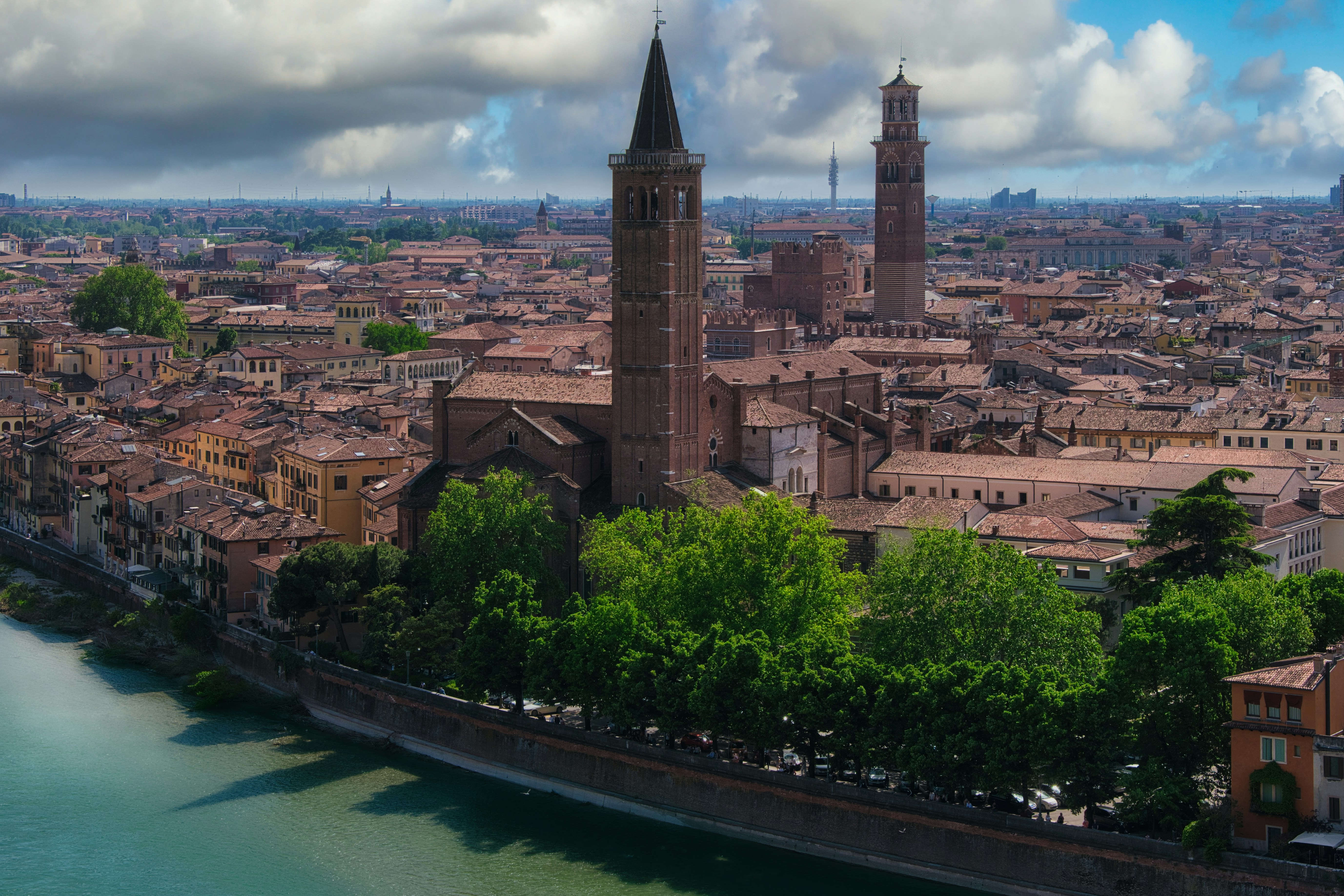 Twin Bell Towers Over a Tuscan Harbor: A City Above the Water