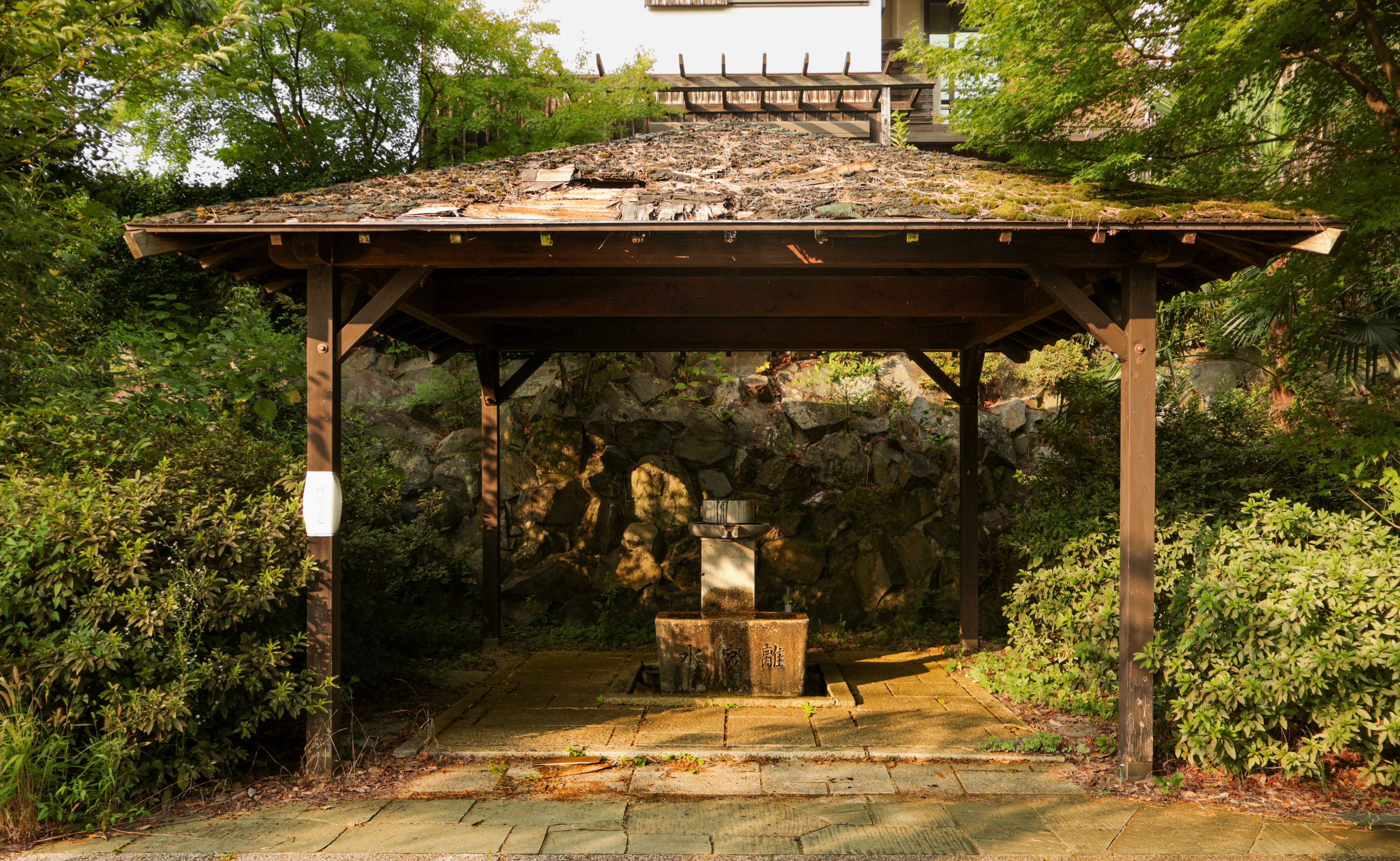 Shaded Shrine Courtyard: A Quiet Kintsugi of Stone and Wood