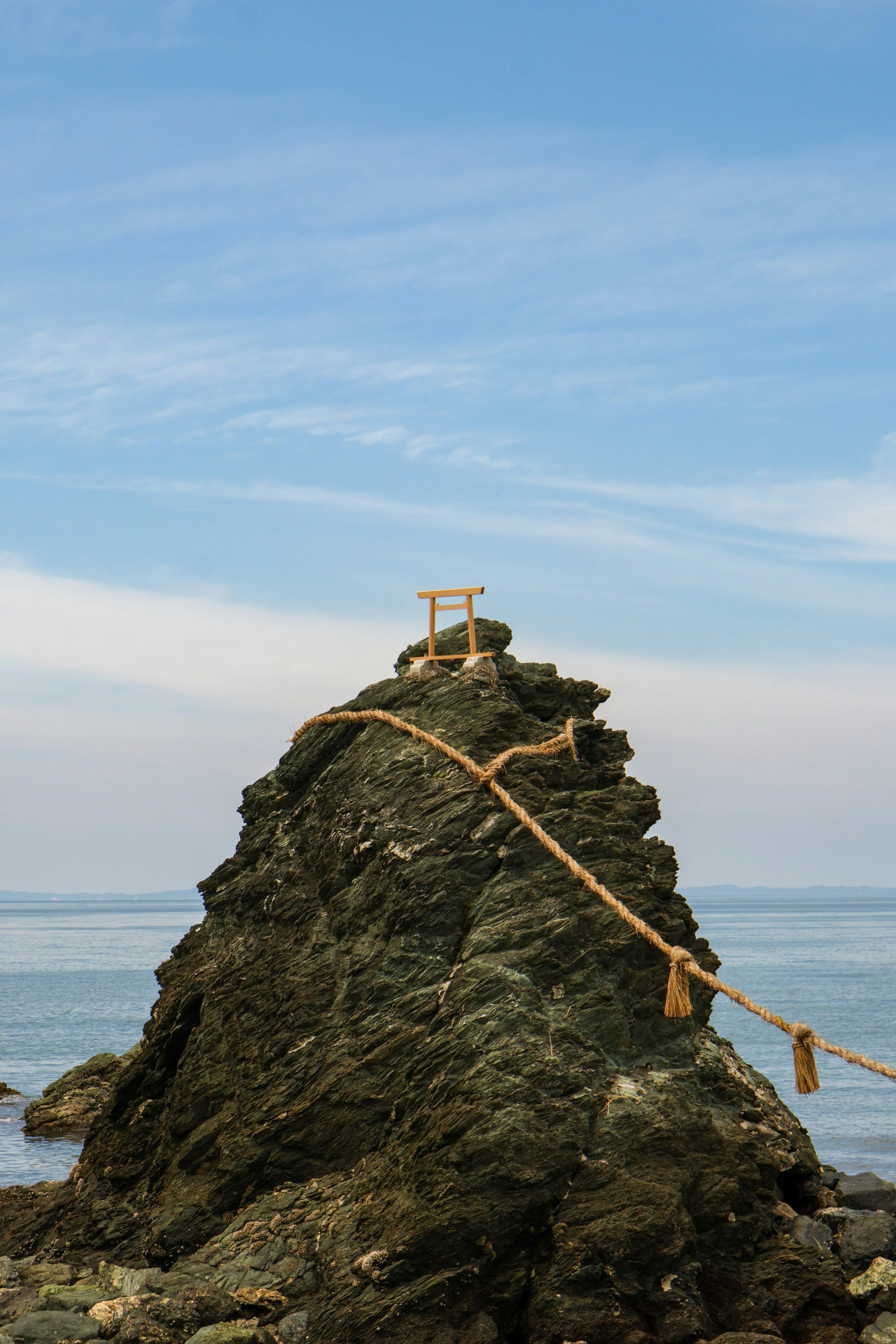 Sacred Knot on the Sea: A Lone Torii-like Ritual on a Jagged Peak