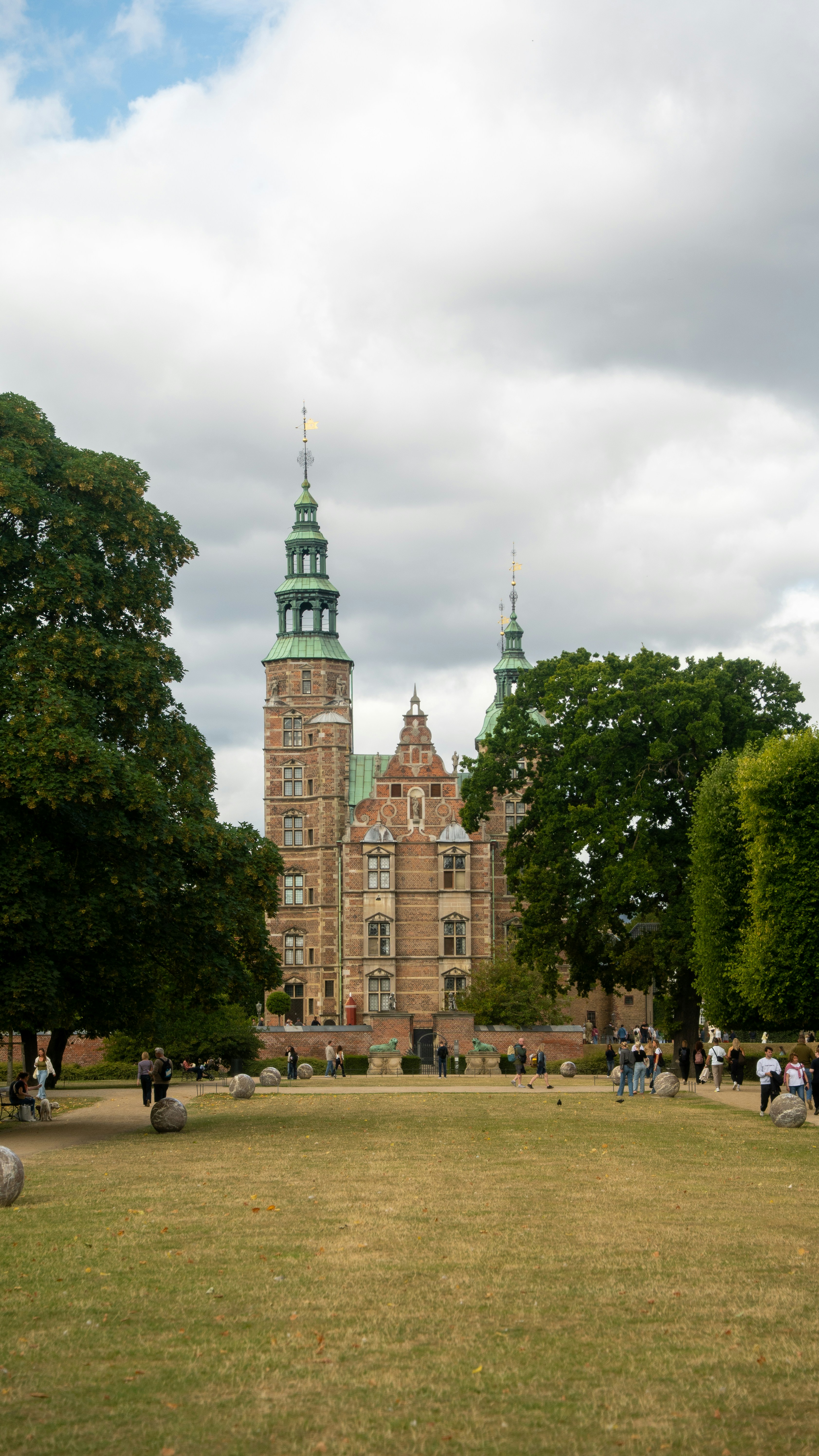 Perspective of a Historic Gatehouse: Central Cathedral Towers Rising Over the Park