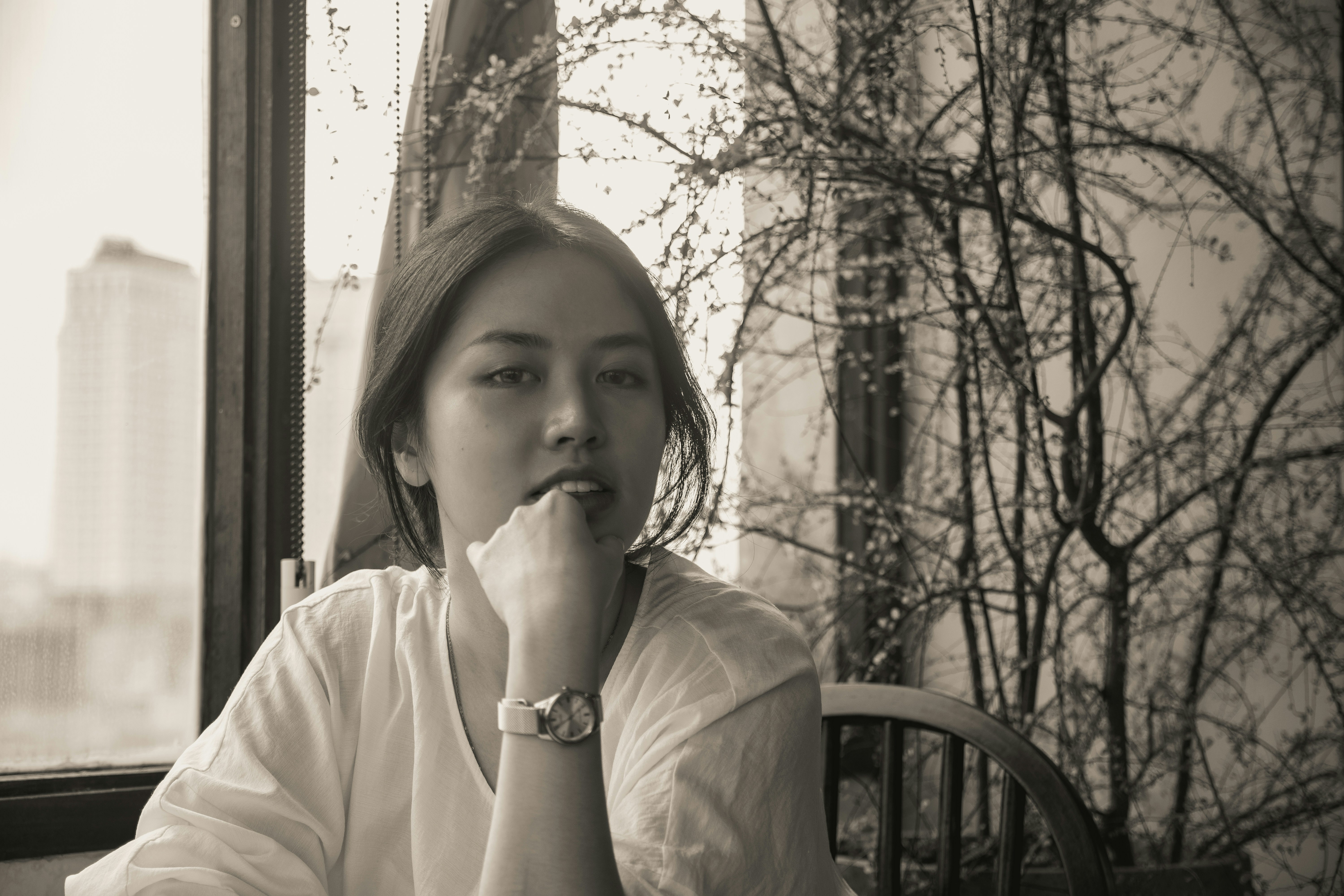 Quiet Contemplation by the Window
