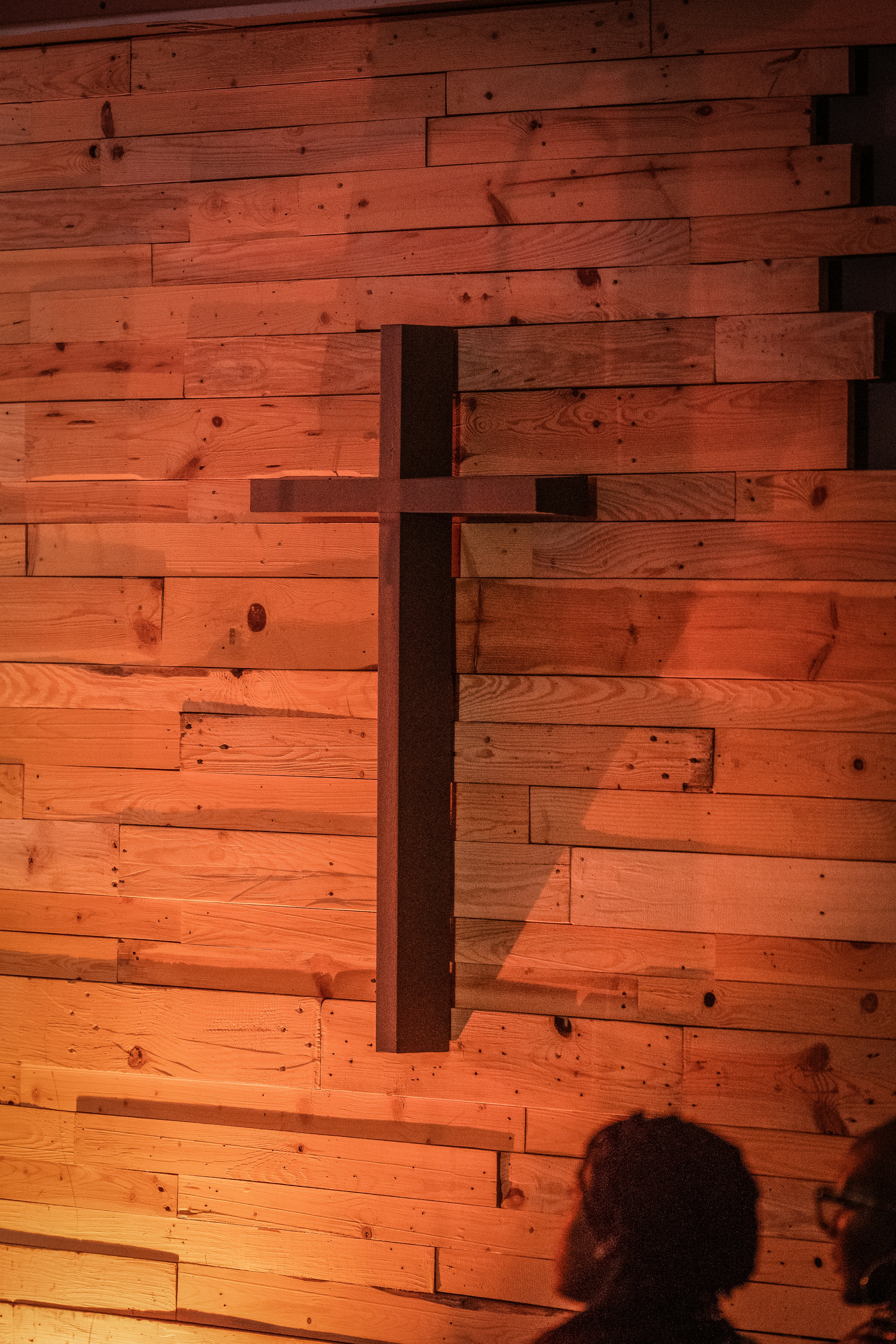 Crossing Beams of Light Over Wooden Wall