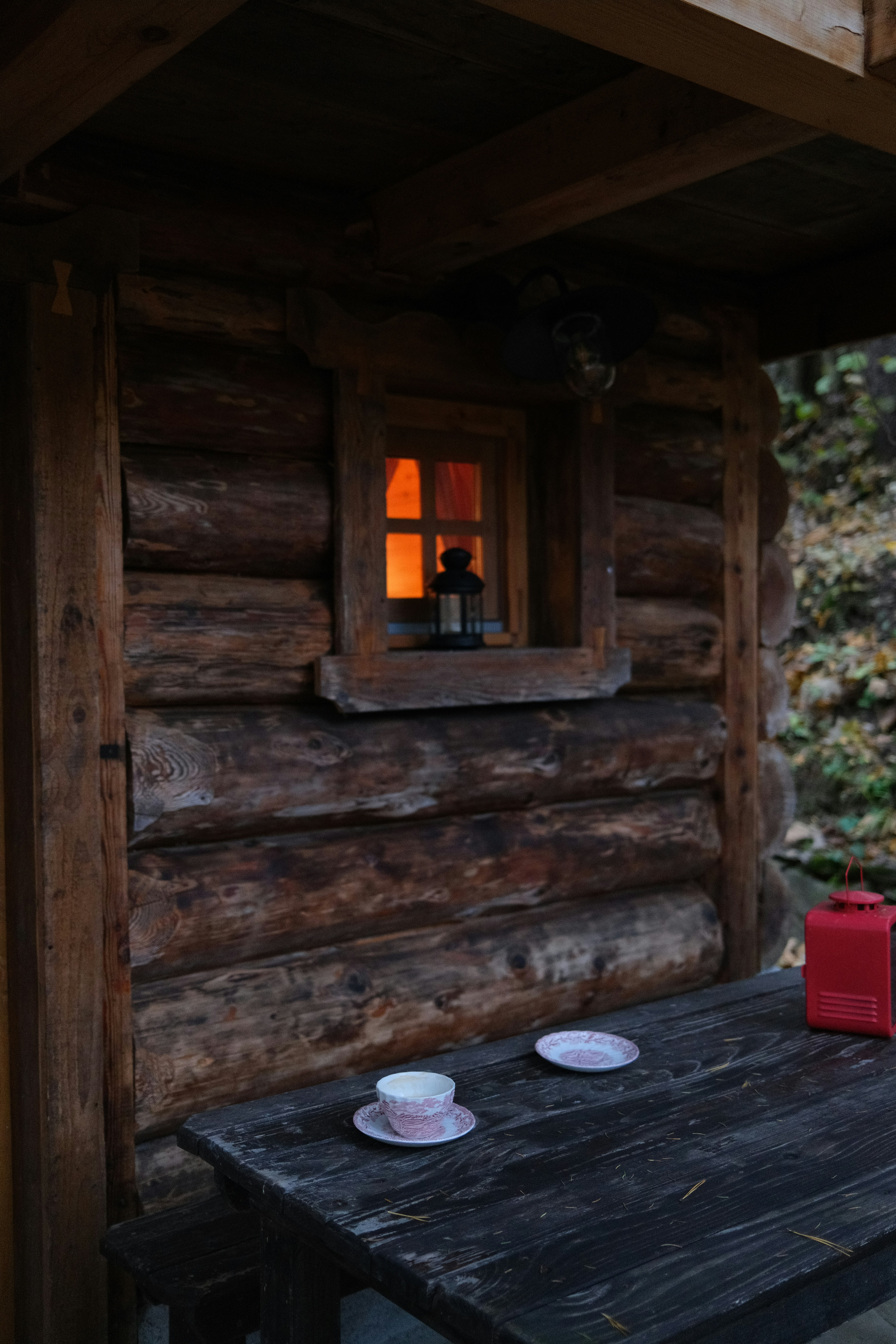 Lantern Glow Through a Rustic Window