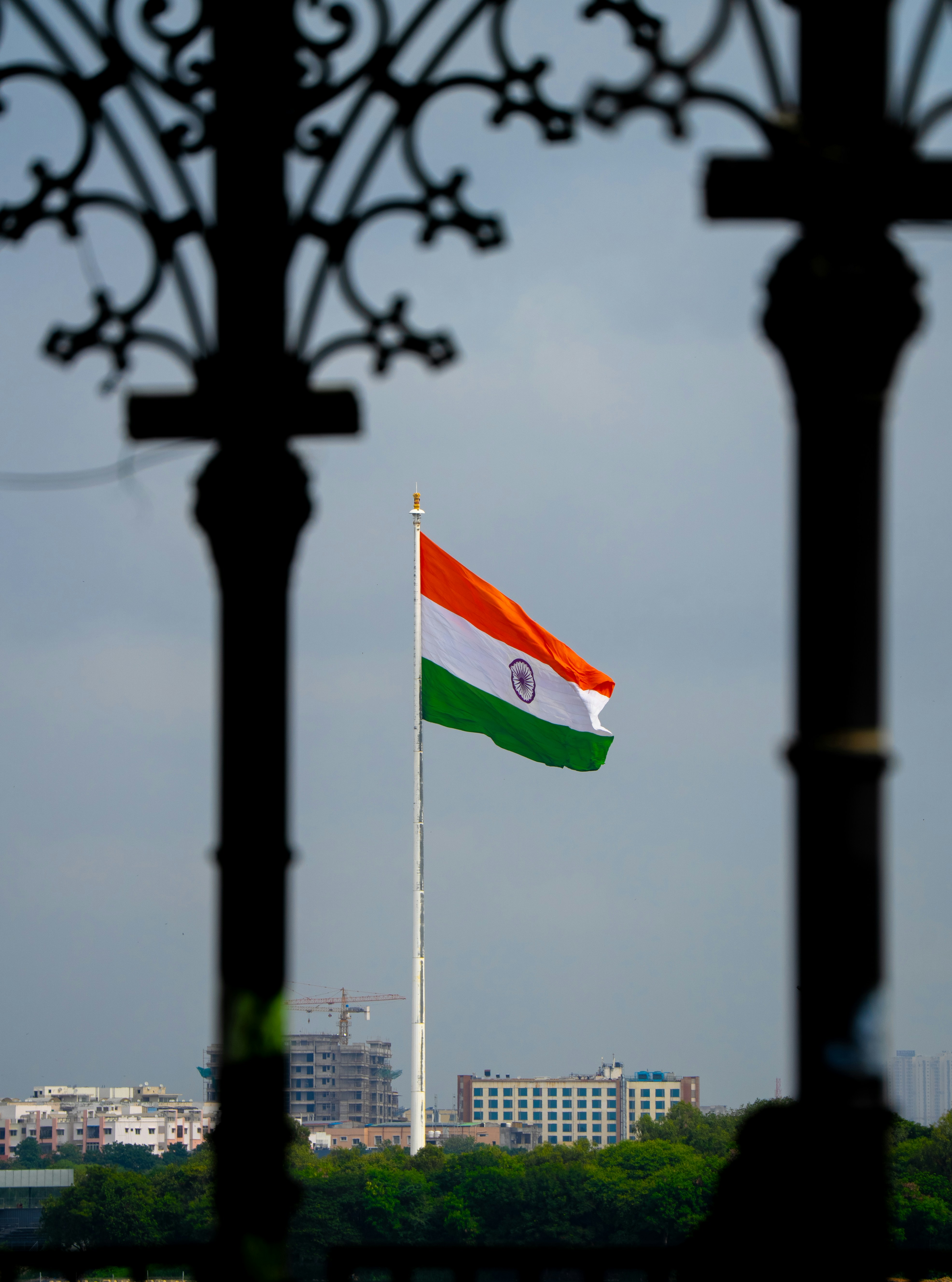 India’s Flag Rising Above the Foreground Silhouettes