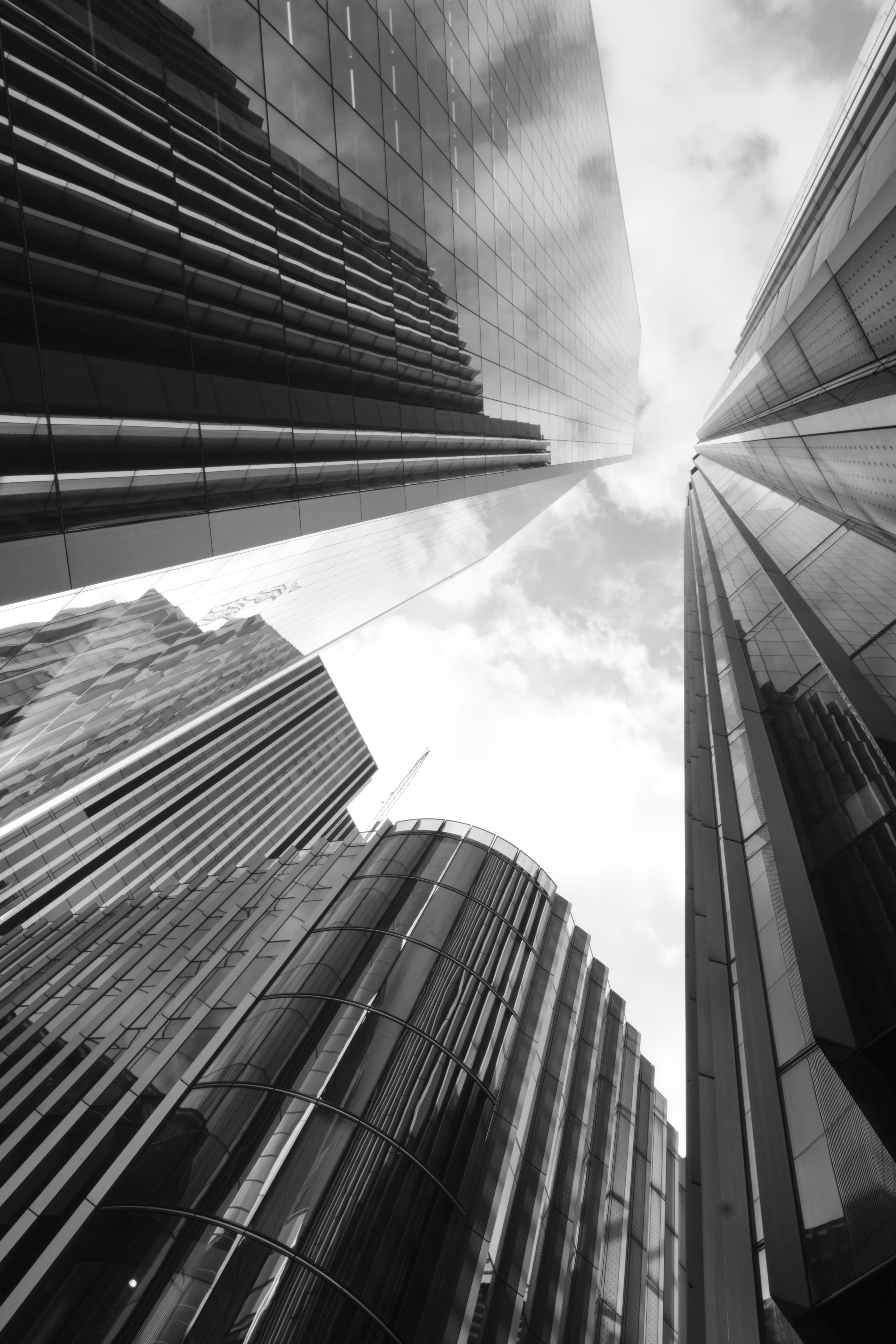 Skyward Convergence: Monochrome Skyscrapers Reaching the Void