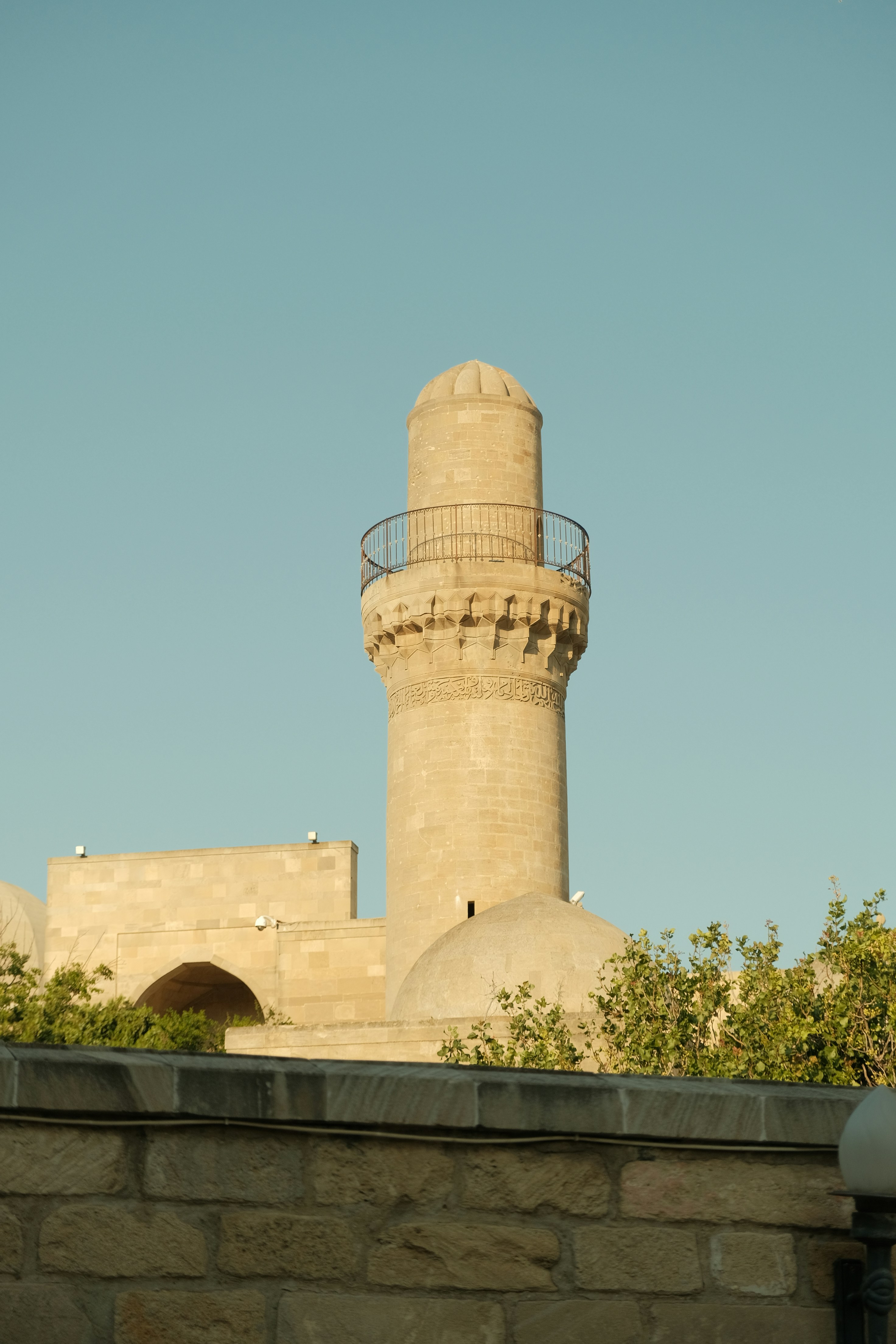 Towering Beacon: Sunrise over the Courtyard Minaret