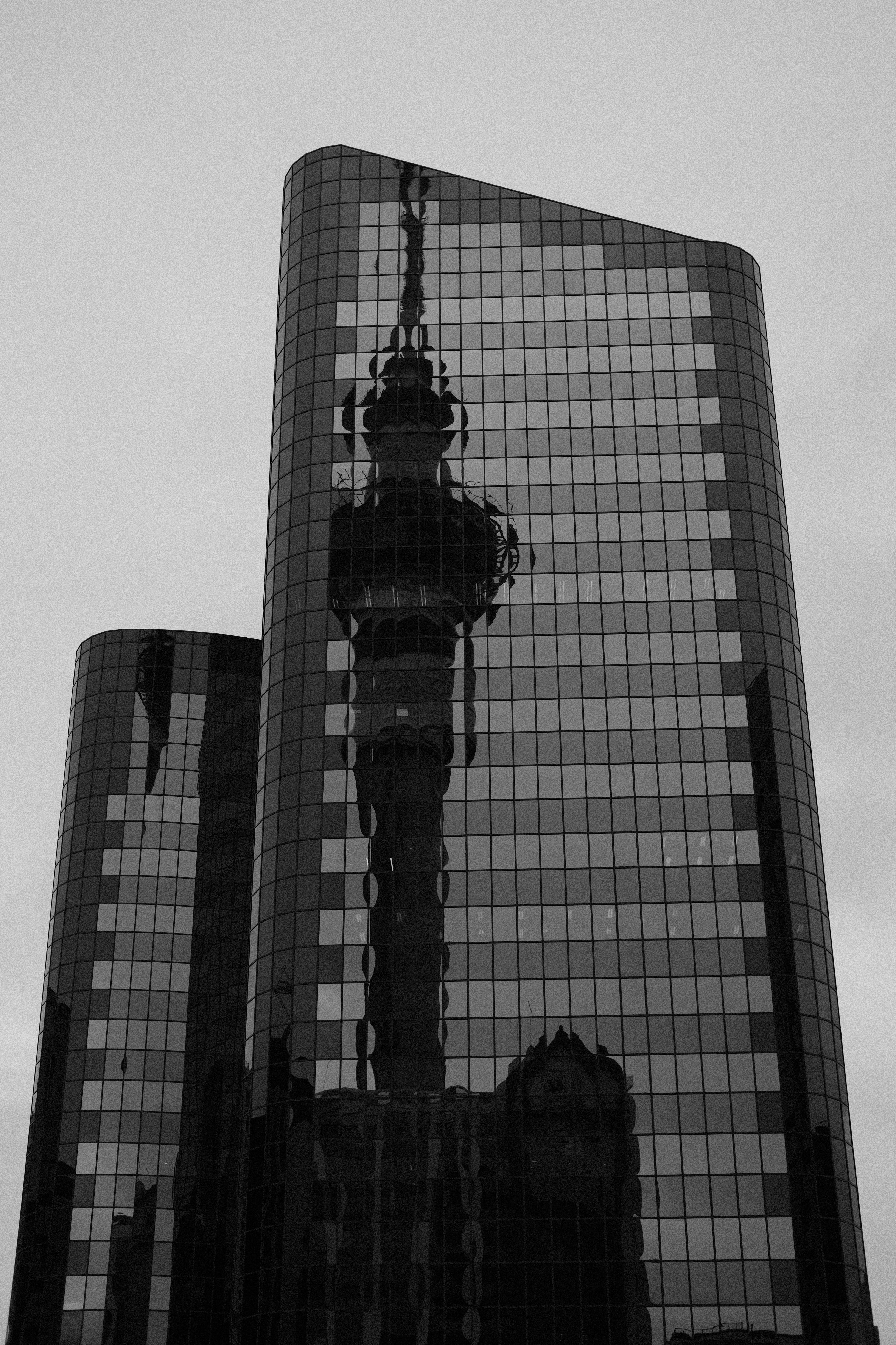 Reflection Tower: Glass Facades Mirror a Timeless Landmark