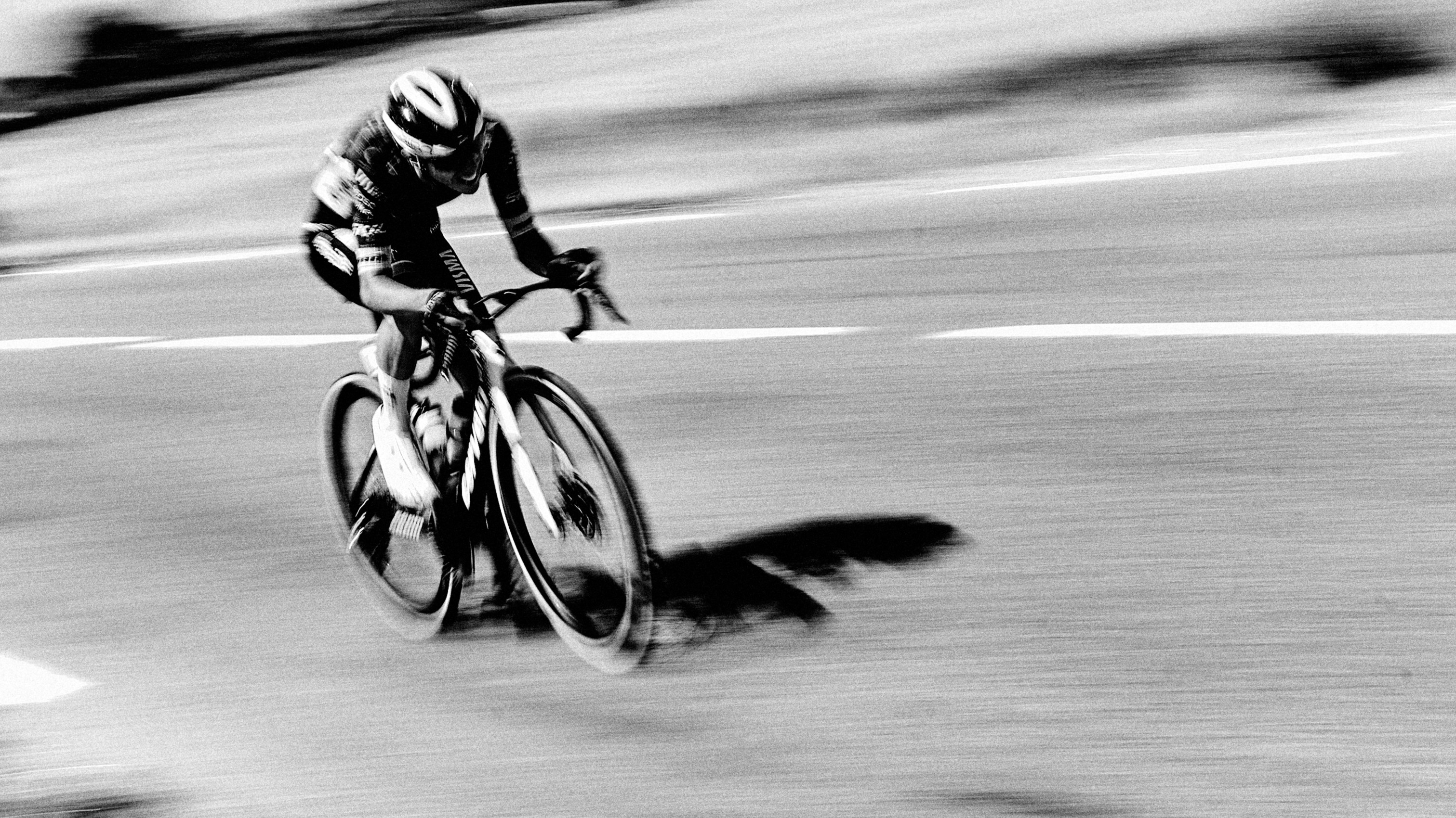 Blurred Sprint: Cyclist in a Quiet Turn