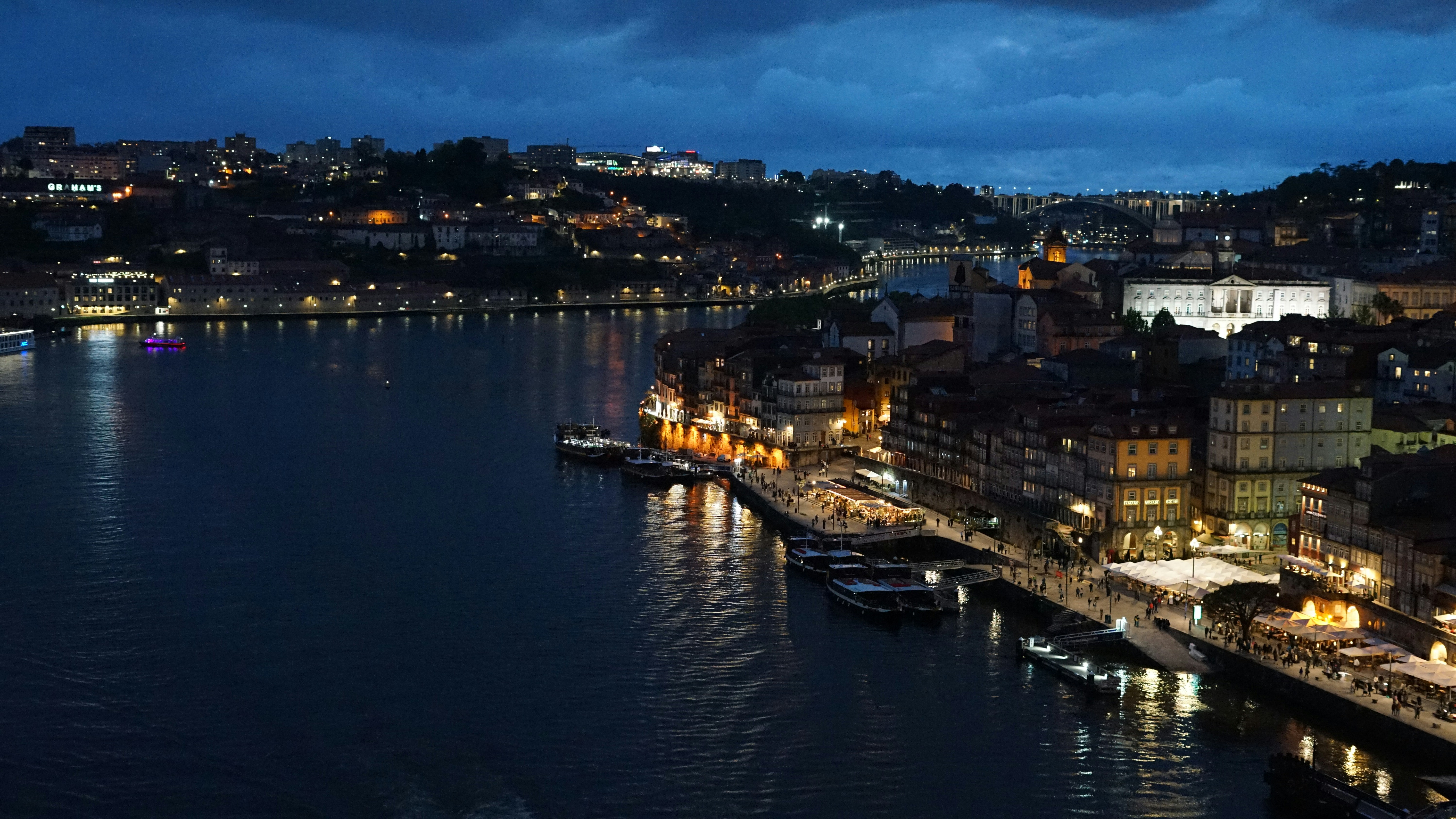 Luminous Evening: Waterfront Town Adrift in Dusk