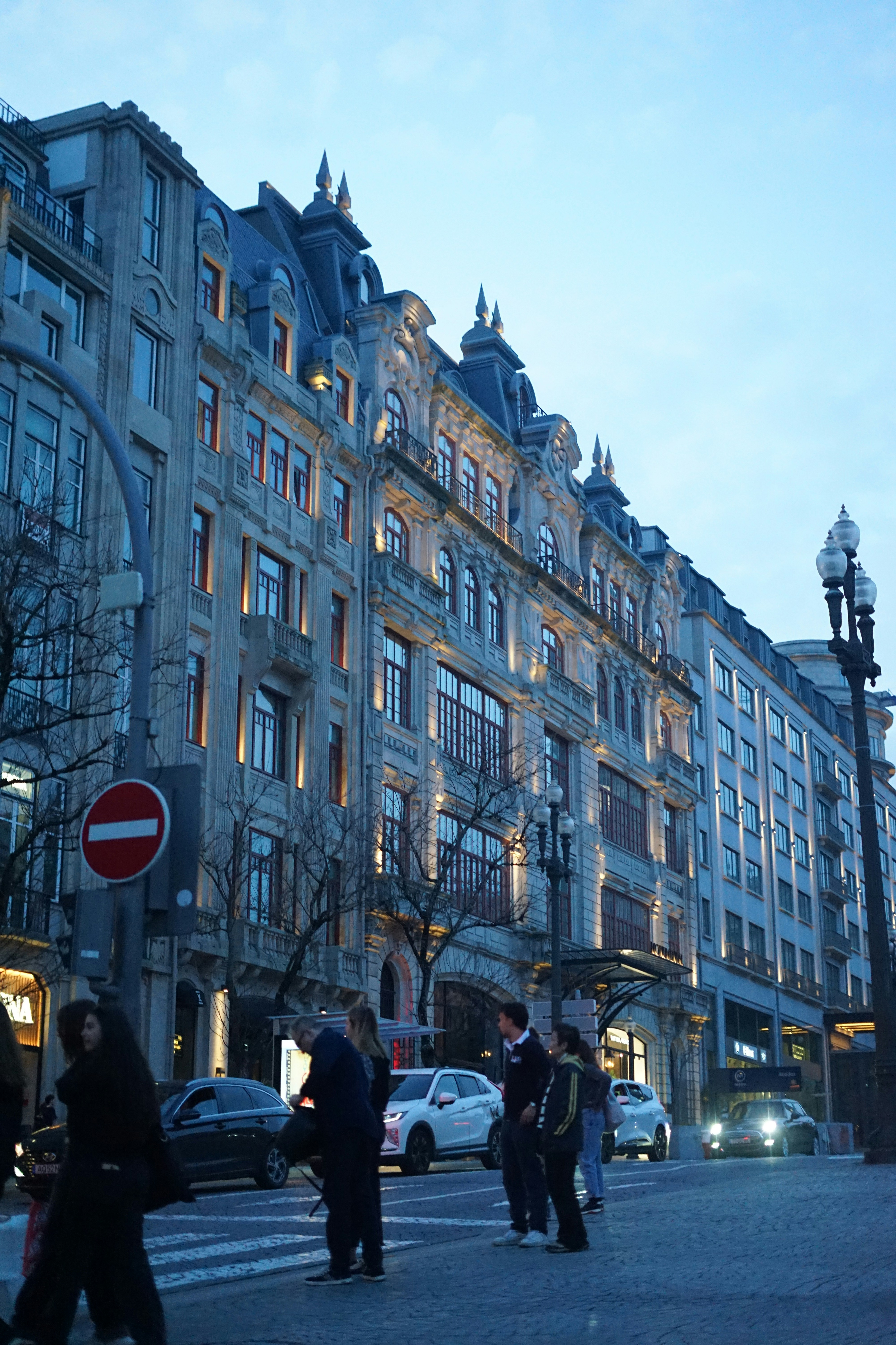 Evening Arcades: Facades and Footfalls on a Lithic Street