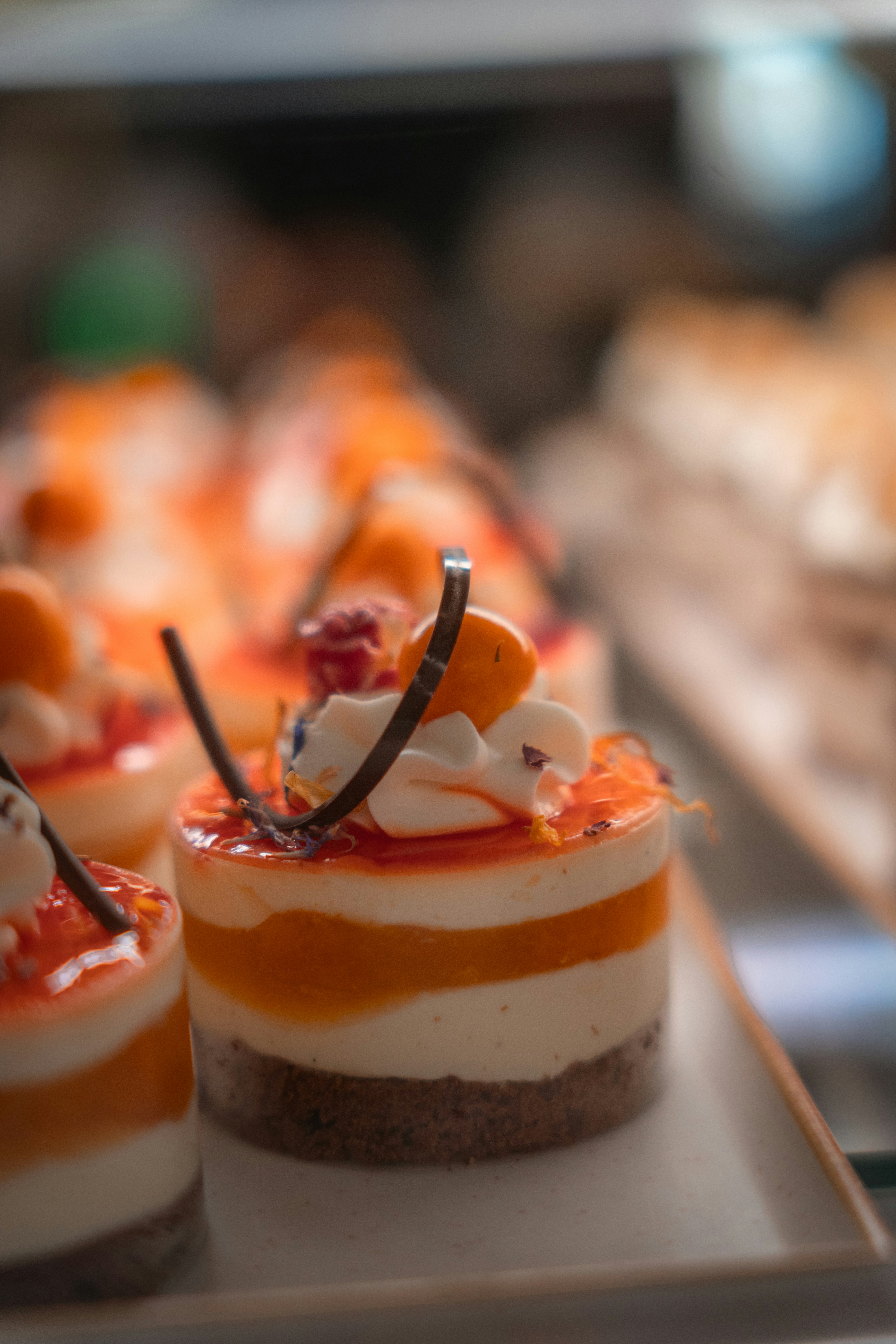 Silky Cheesecake Towers on a Bakery Tray