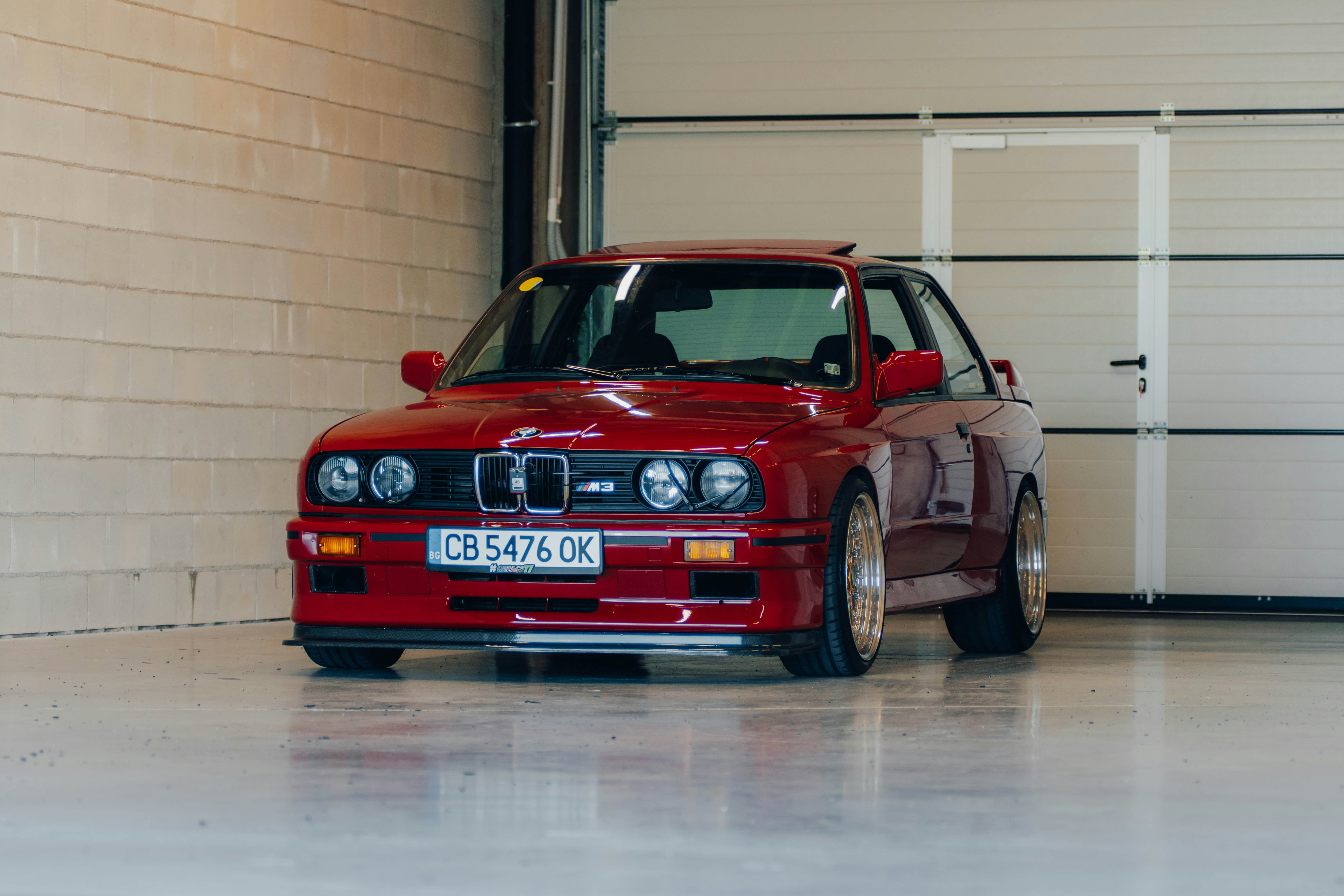 Red Classic BMW Resting in a Quiet Garage