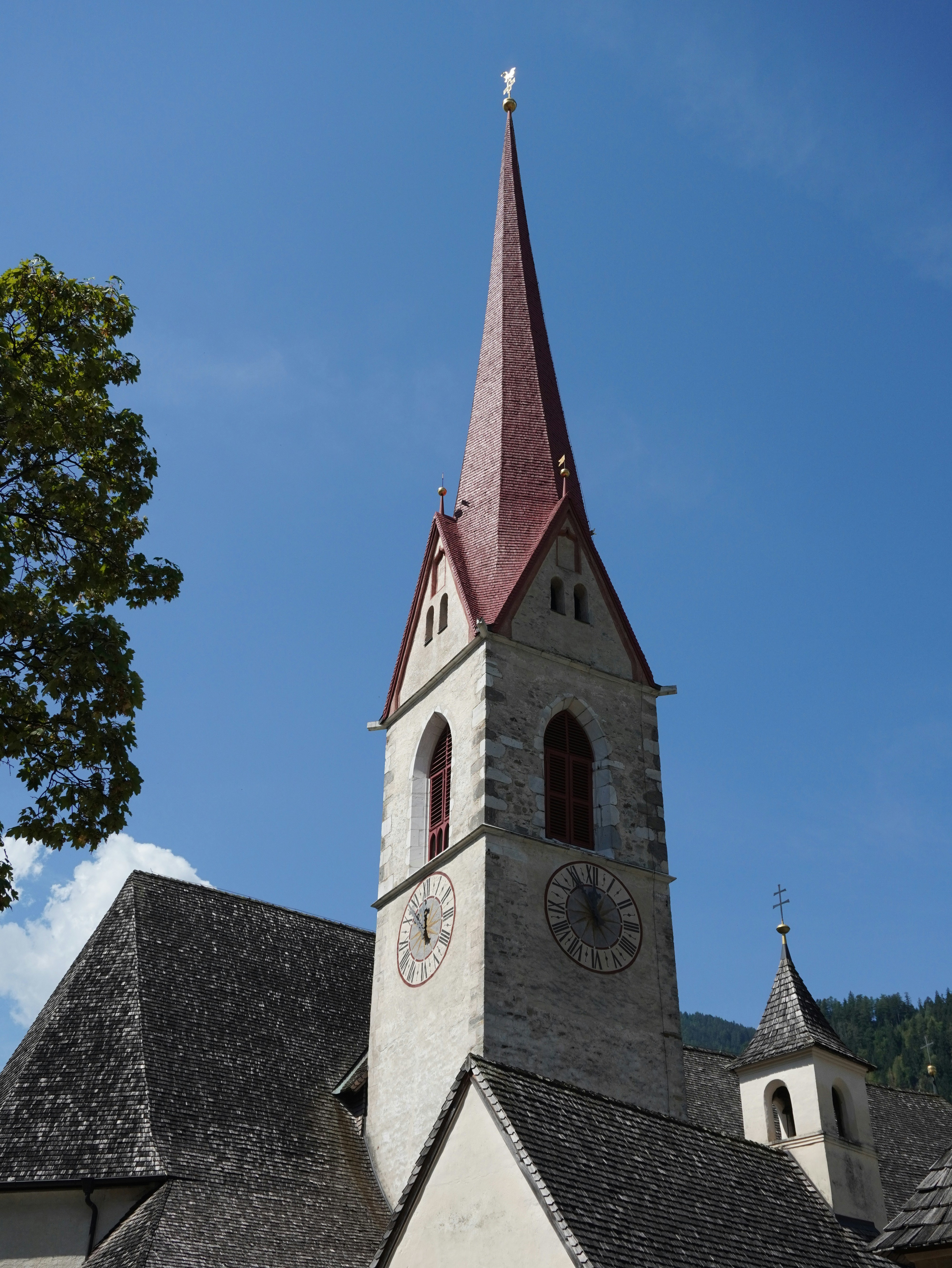 Spire Against the Alpine Sky