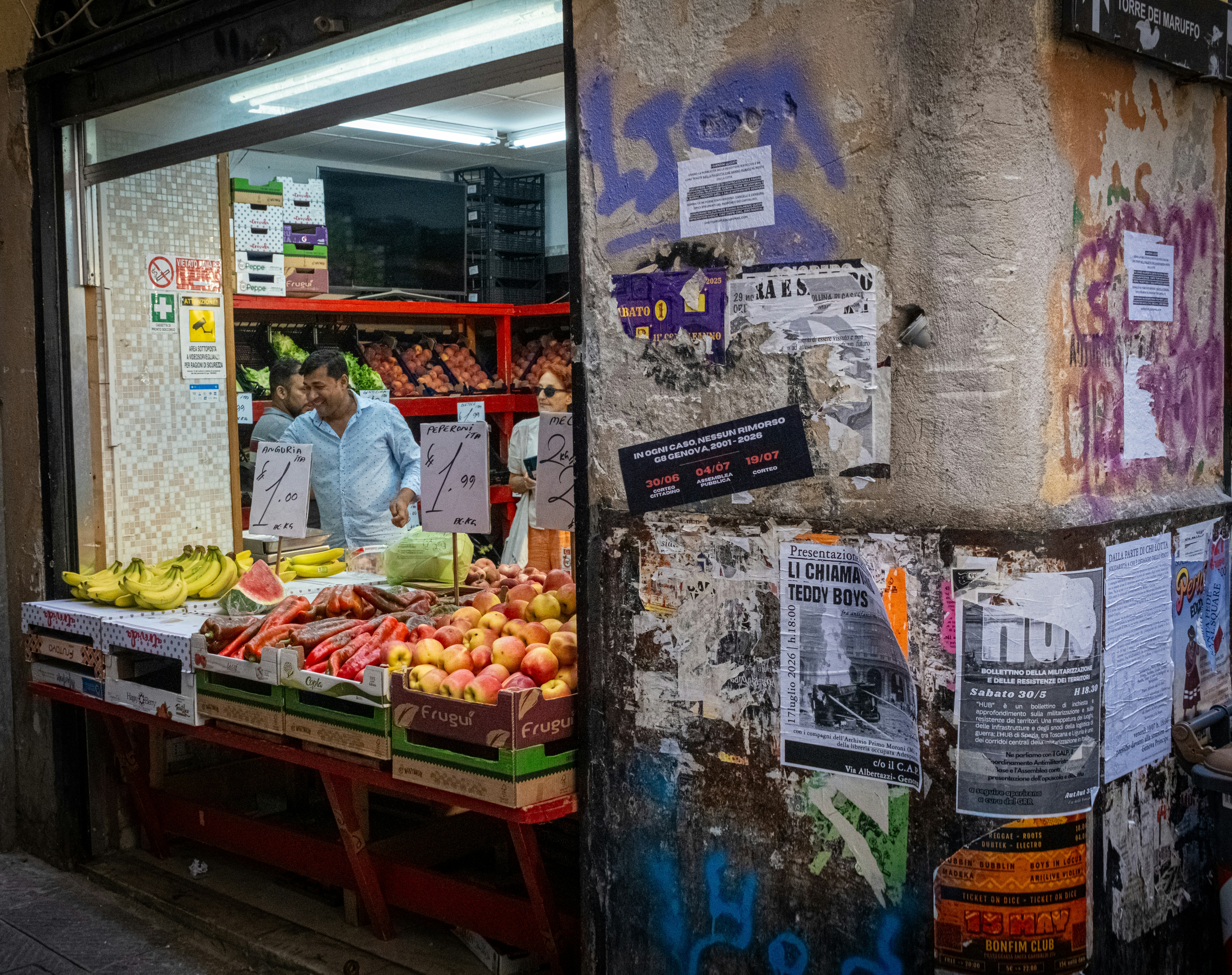 Banana and Apple Stall at a Graffiti-Adorned Urban Alley