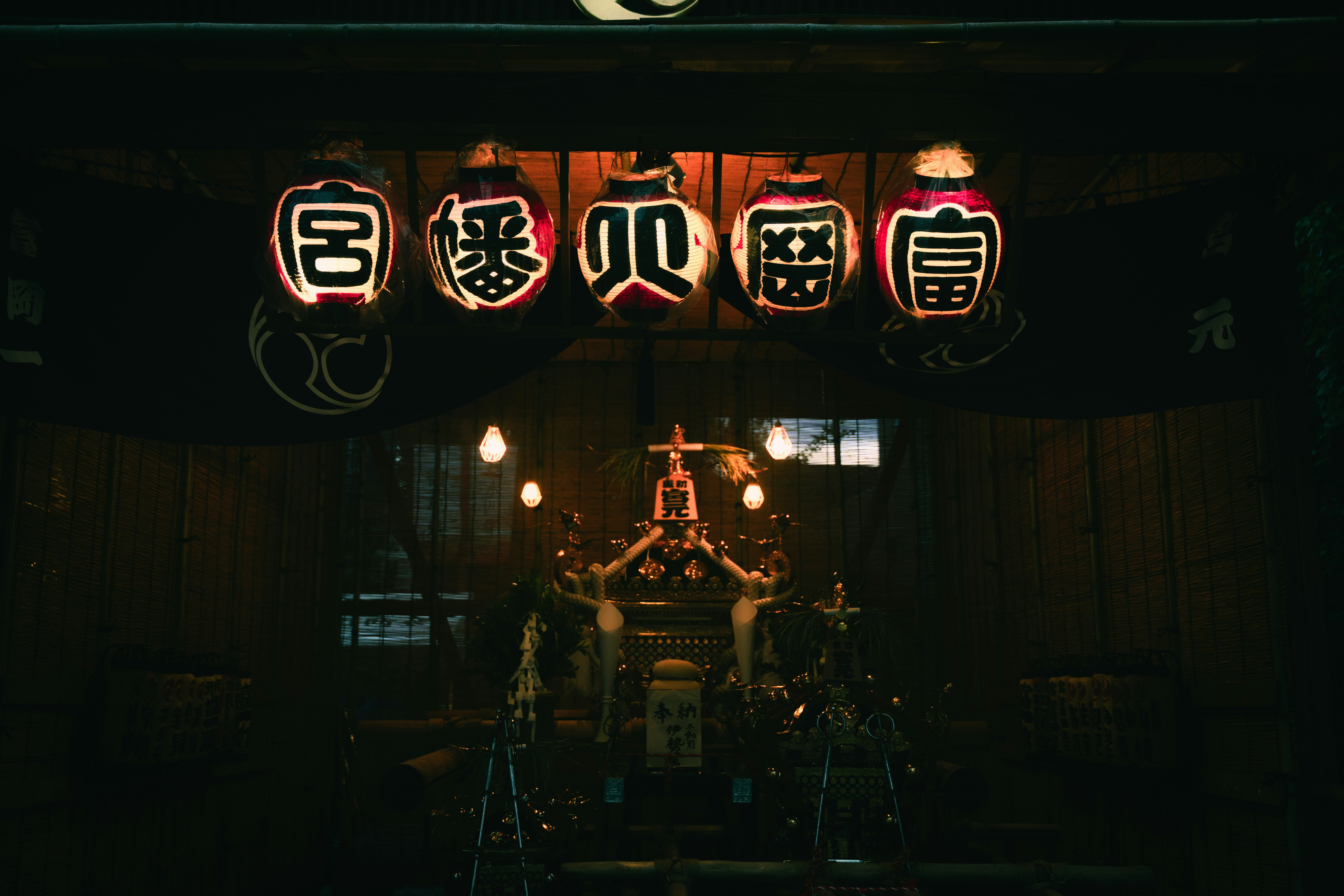 Lantern-lit Shrine: Quiet Ritual beneath Hanging Characters