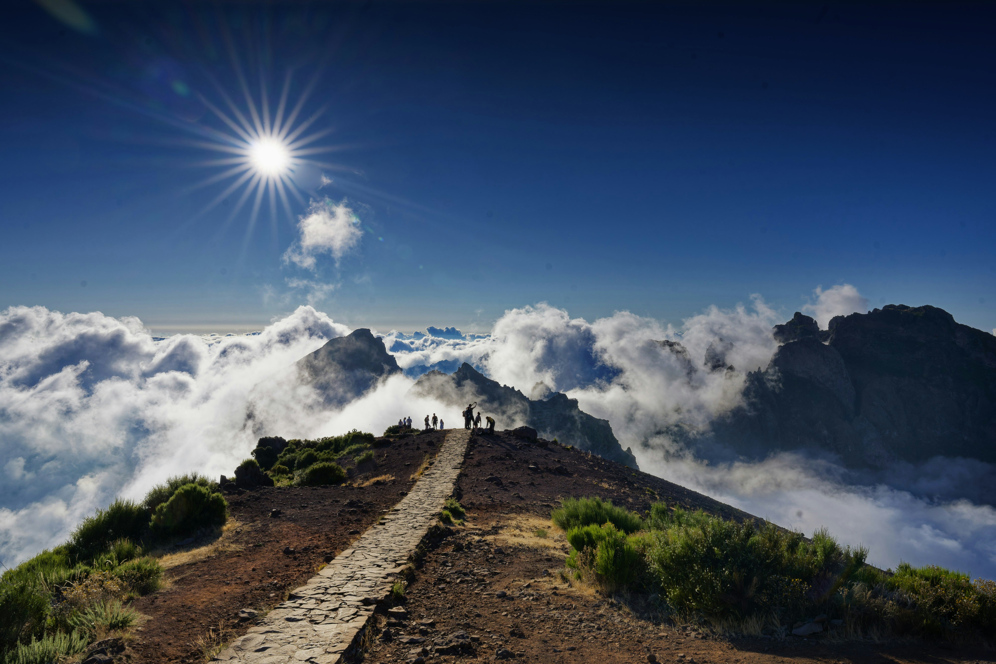 Trail to the Crown: A Sunrise Summit Above the Clouds