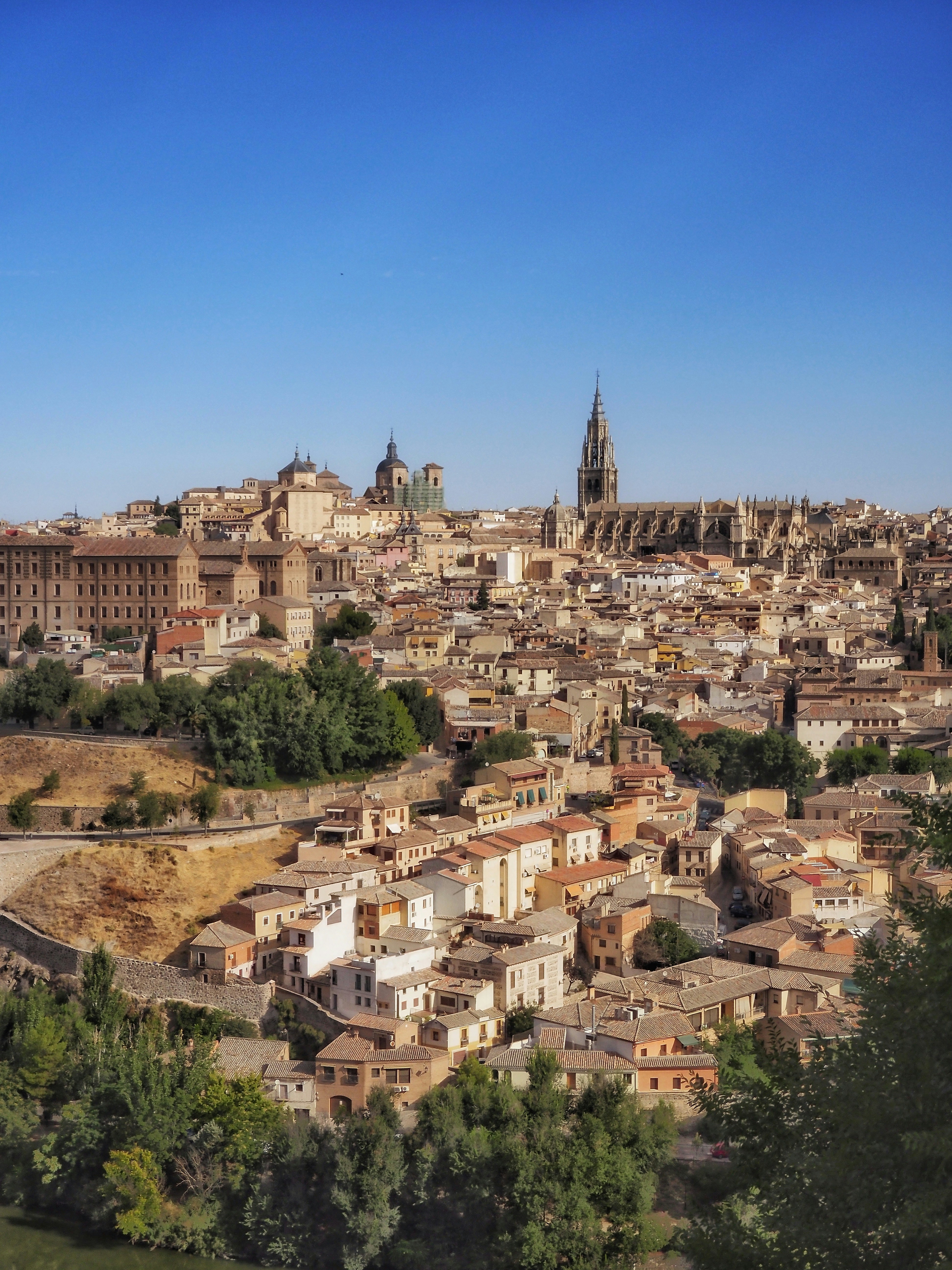 Sunlit Old Town Crowned by a Gothic Spire