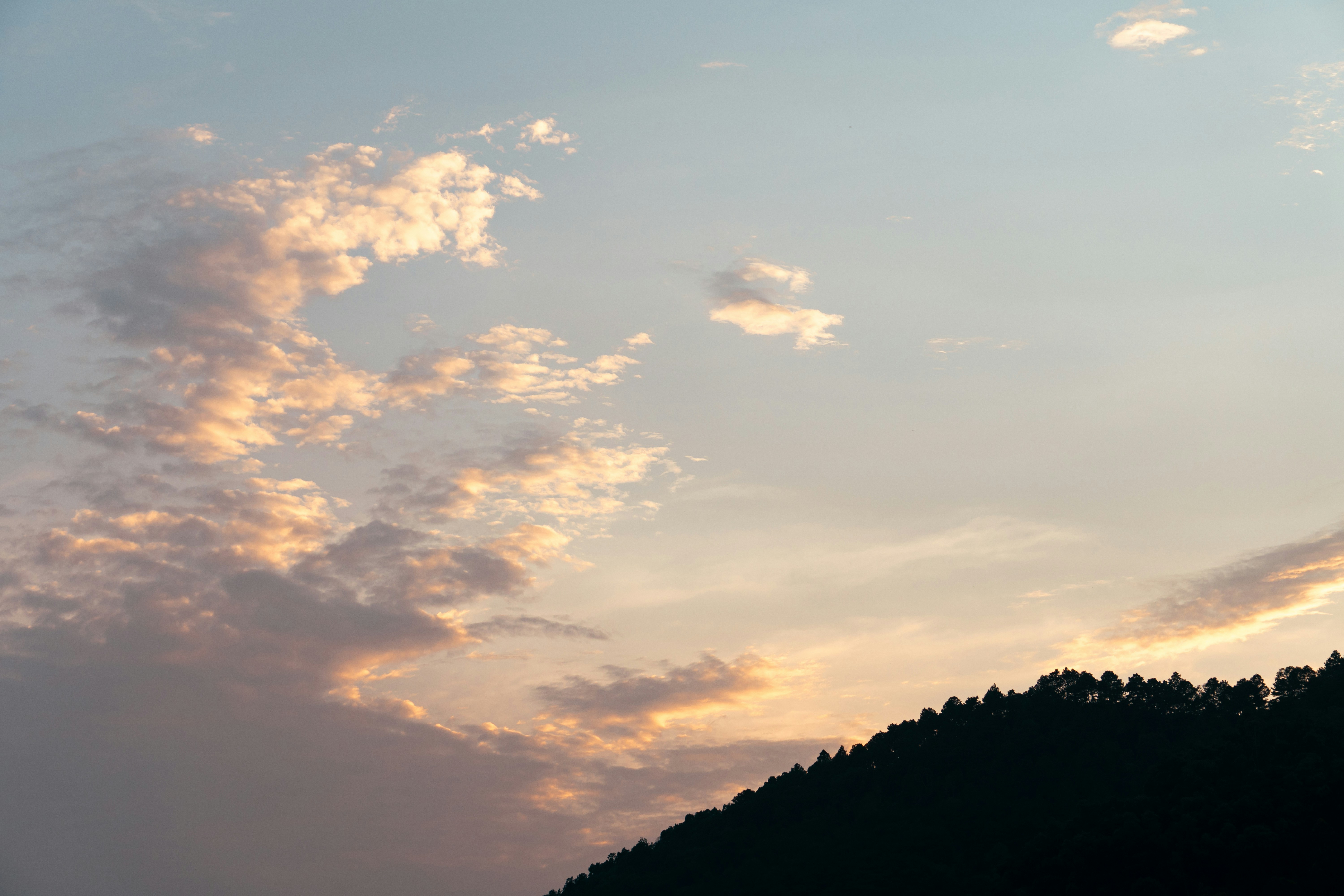 Twilight Silhouette Over Quiet Ridge