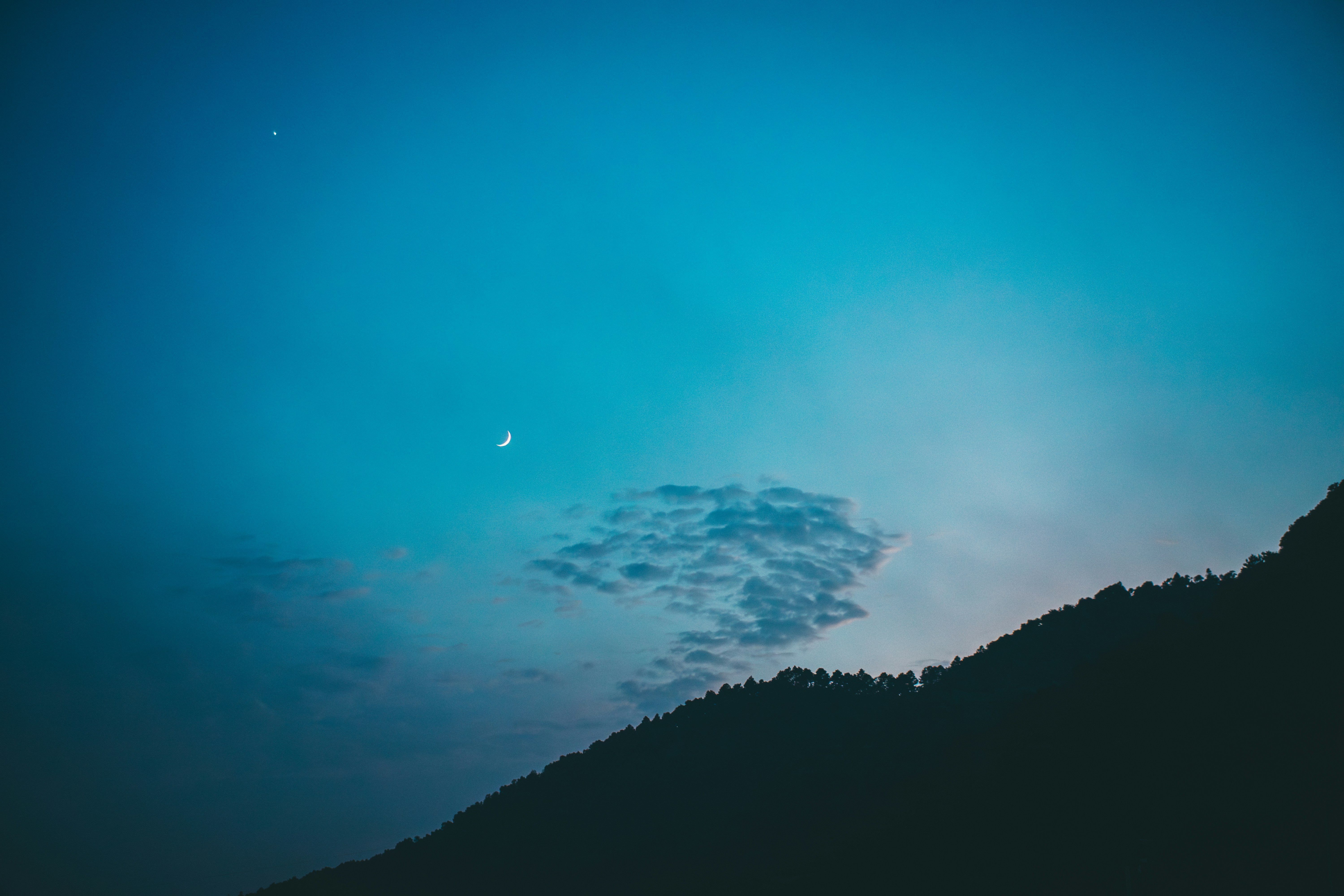 Dawn Crescent Over the Silent Ridge
