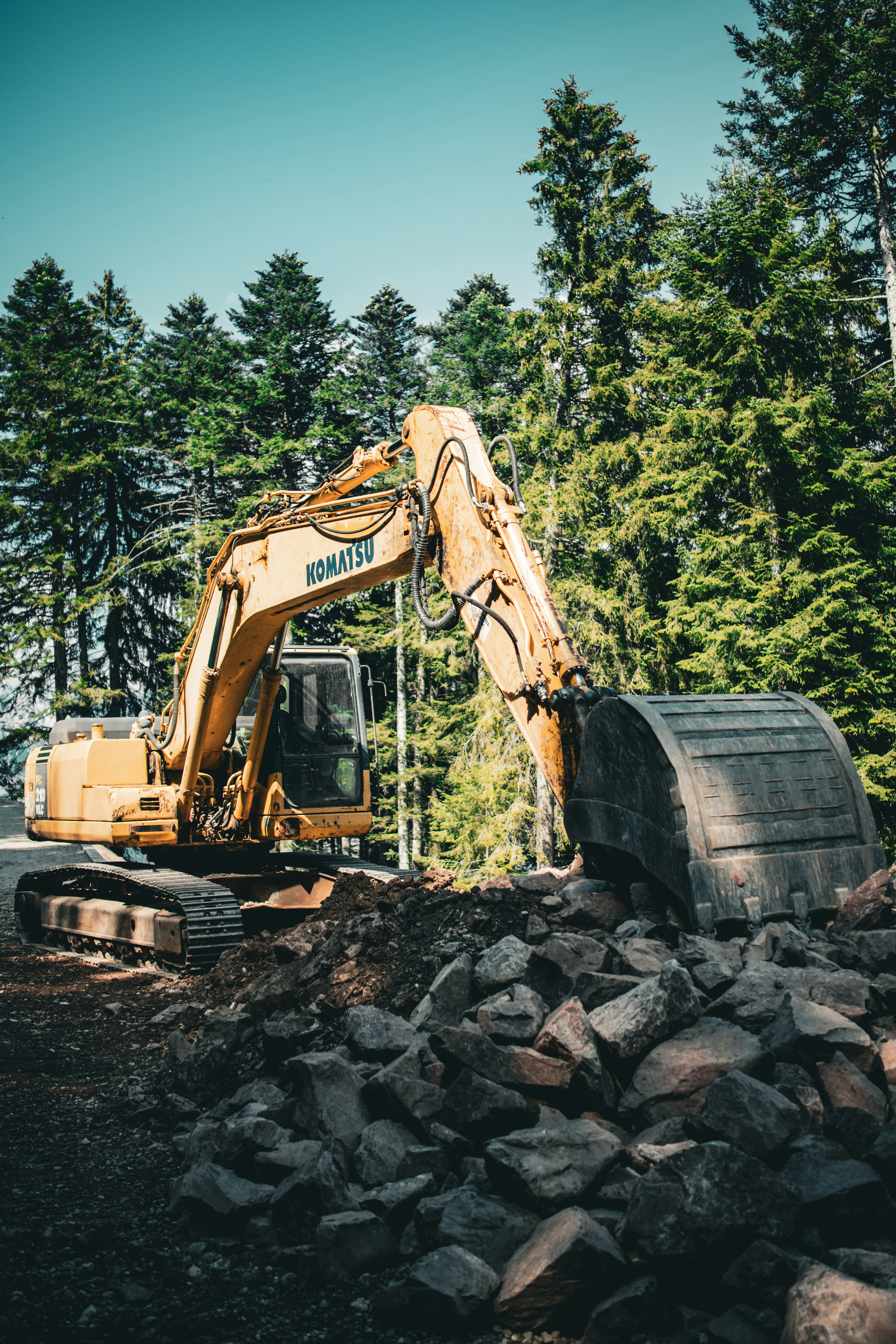 Hydraulic Echo: an Excavator Reclaims a Rocky Spur