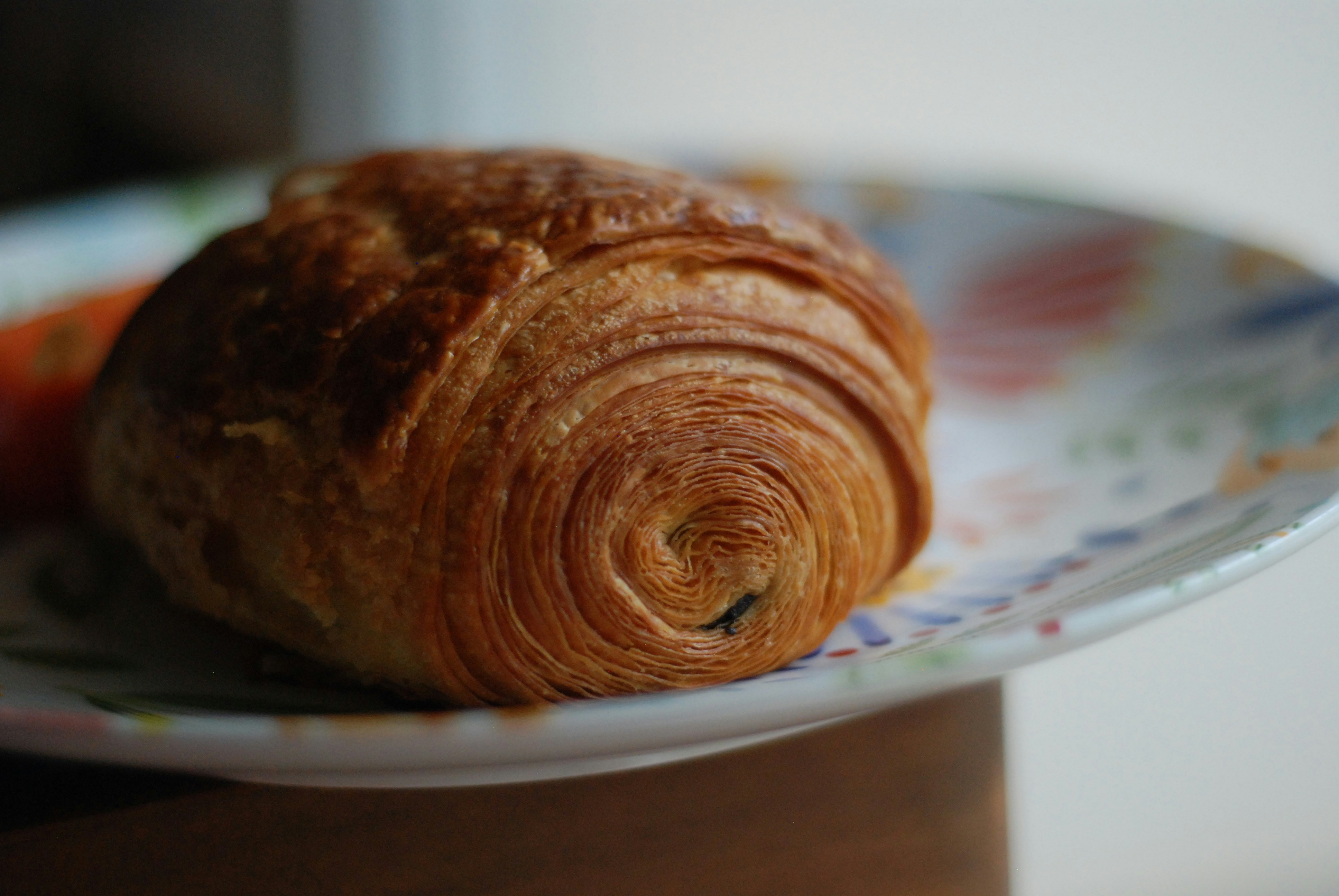 Swirled Croissant on a Floral Plate