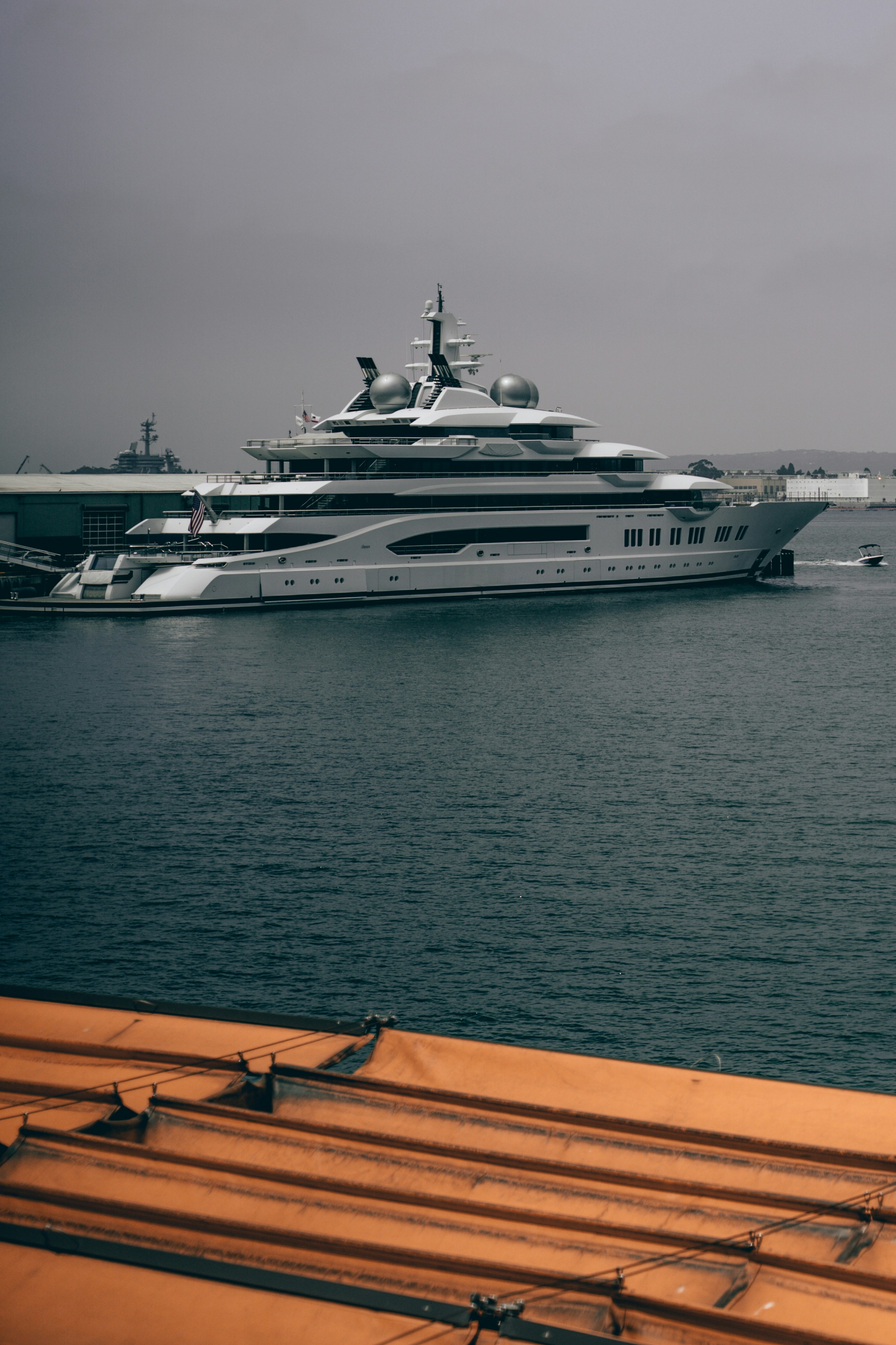 A Quiet Marina Surrounds a Moonlit Superyacht