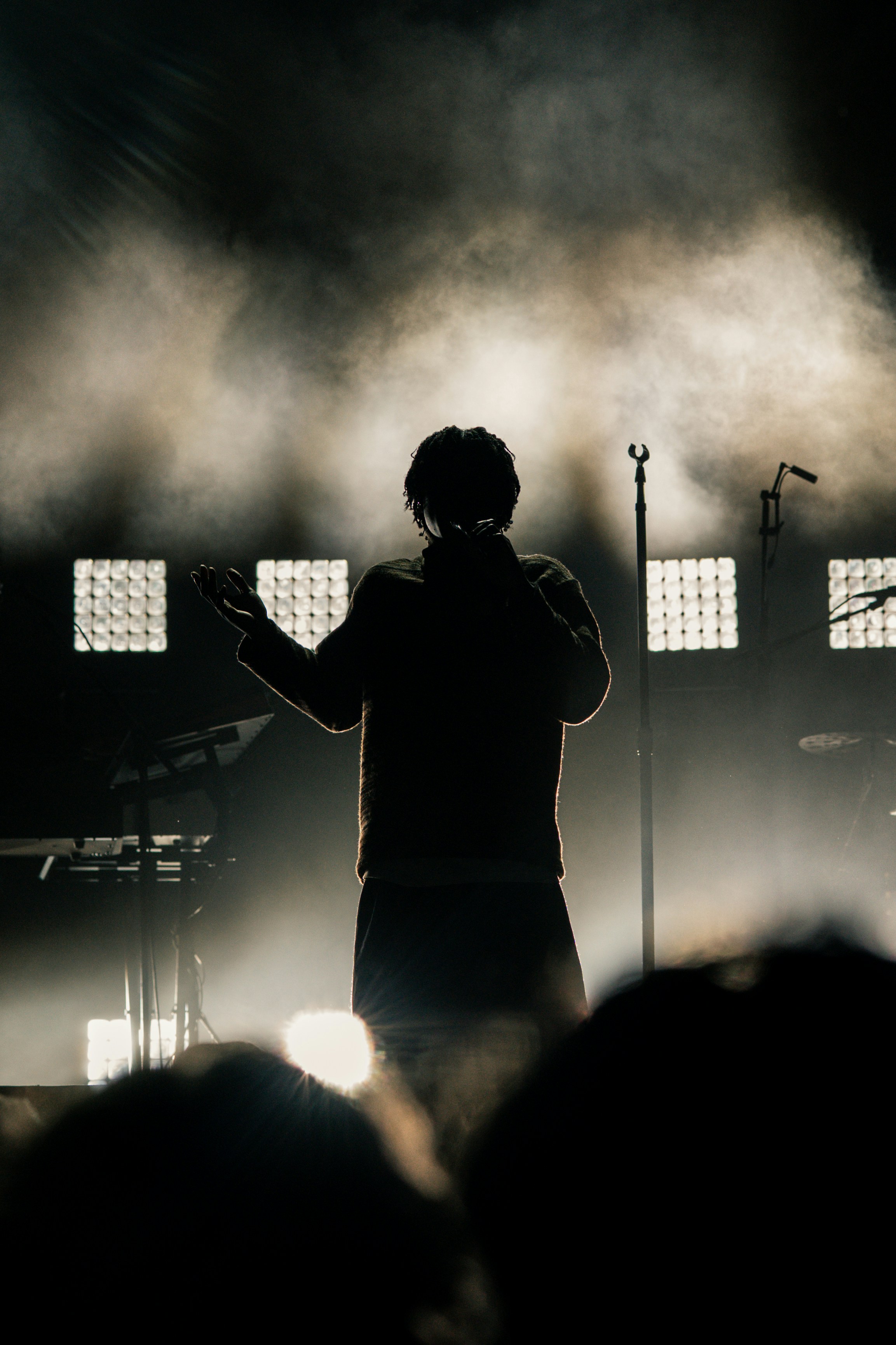 Silhouette in the Smoke: A Stagebound Moment