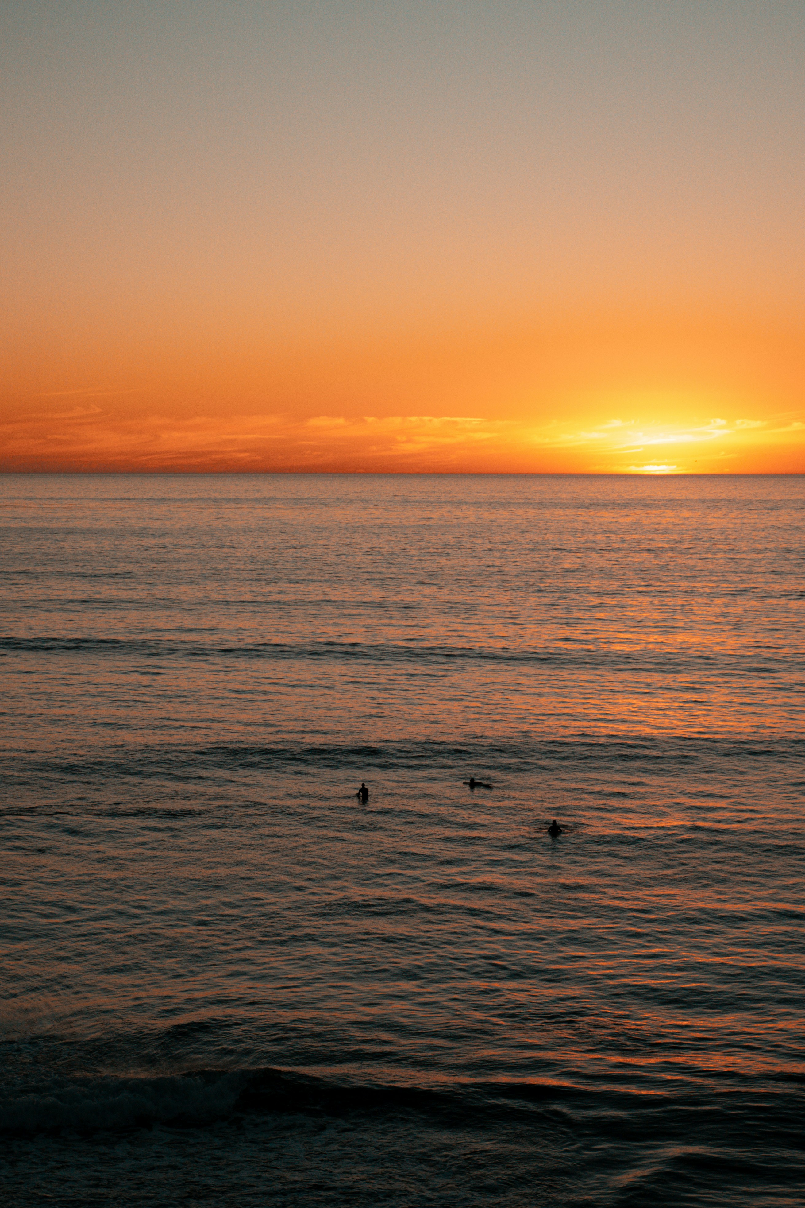 Orange Horizon: Sun Touching the Sea
