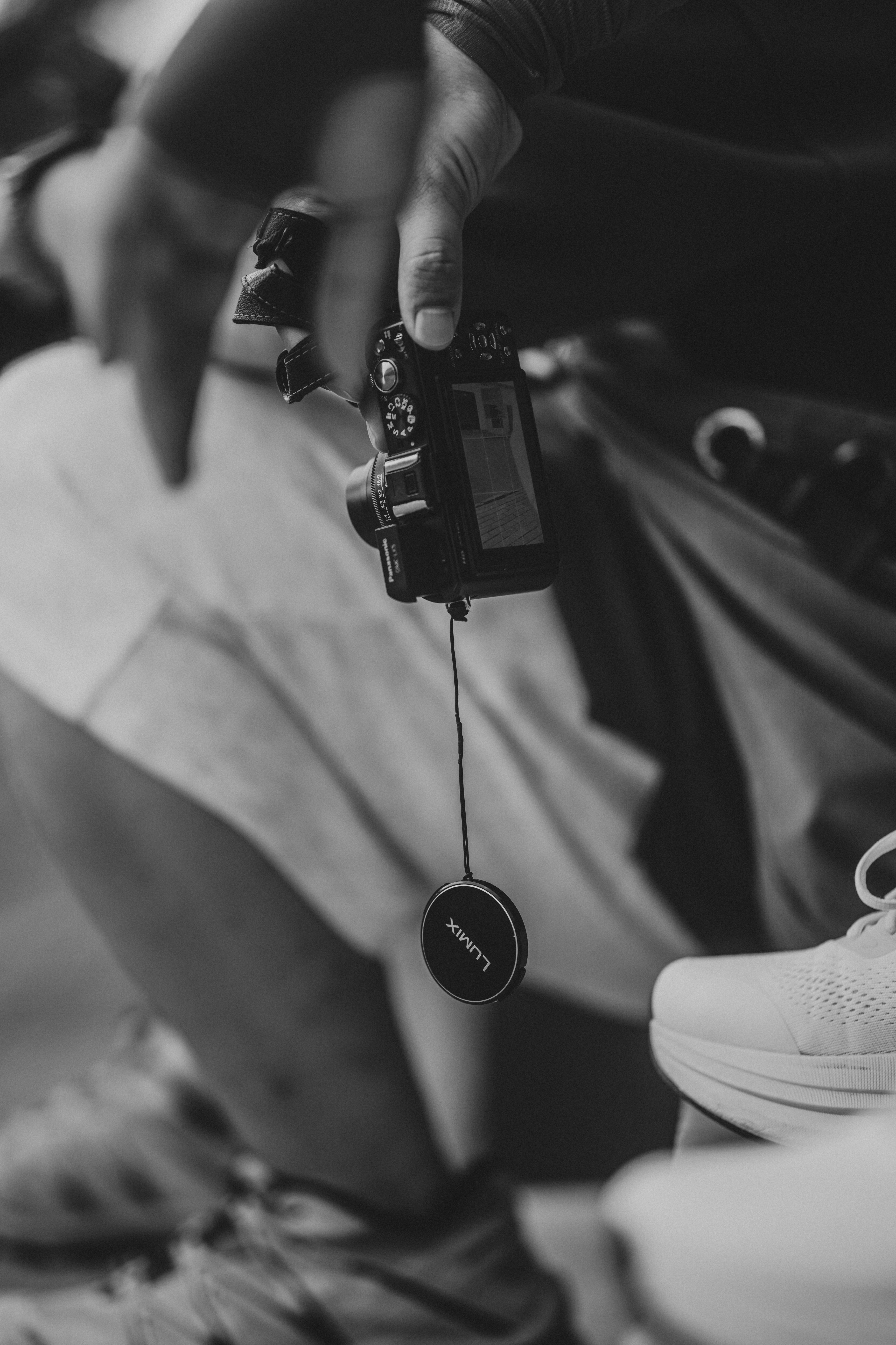 Midnight Grip: The Hand, Lens, and Lens Cap