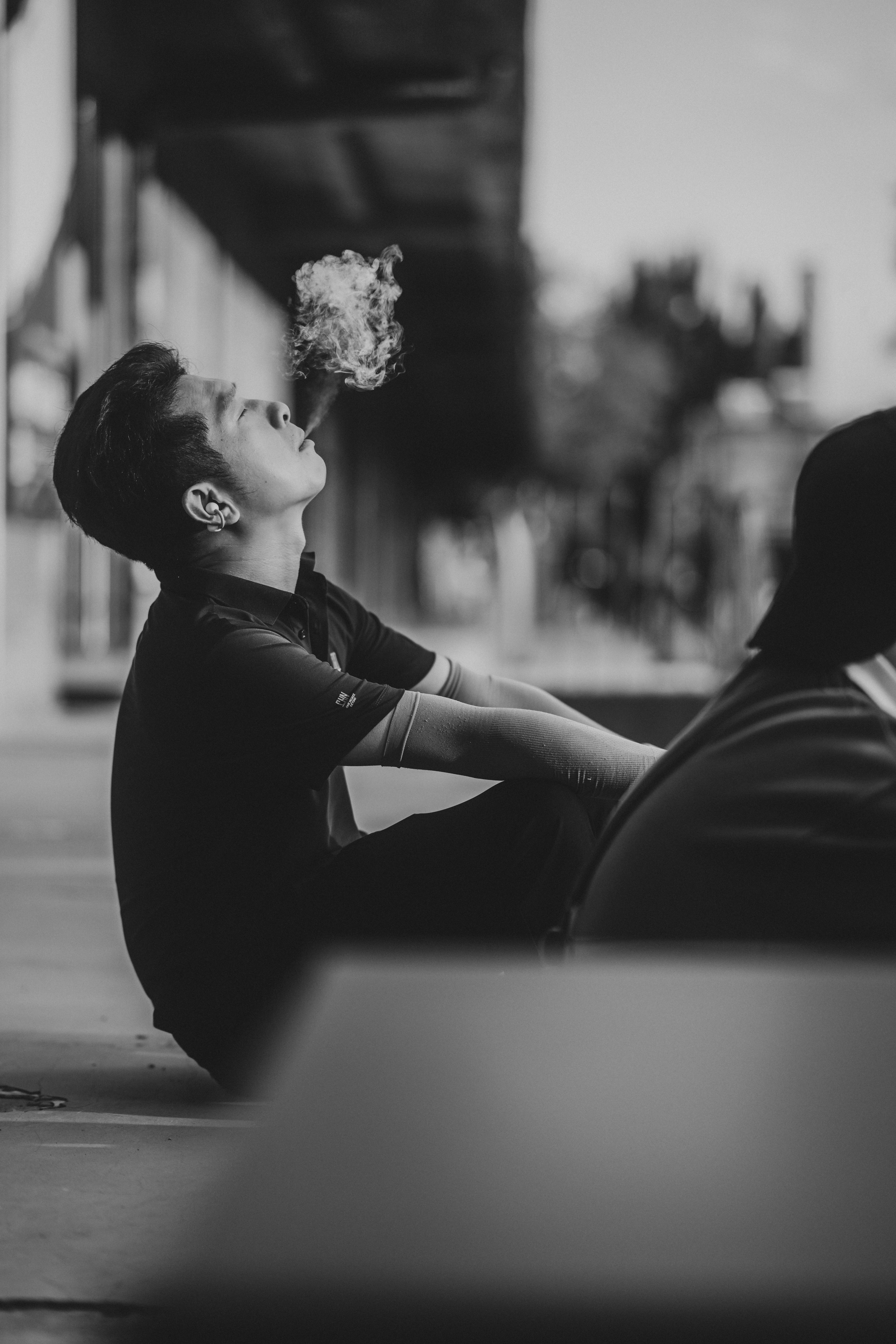 Crimson Breath: A Quiet Moment of Smoke and Solitude