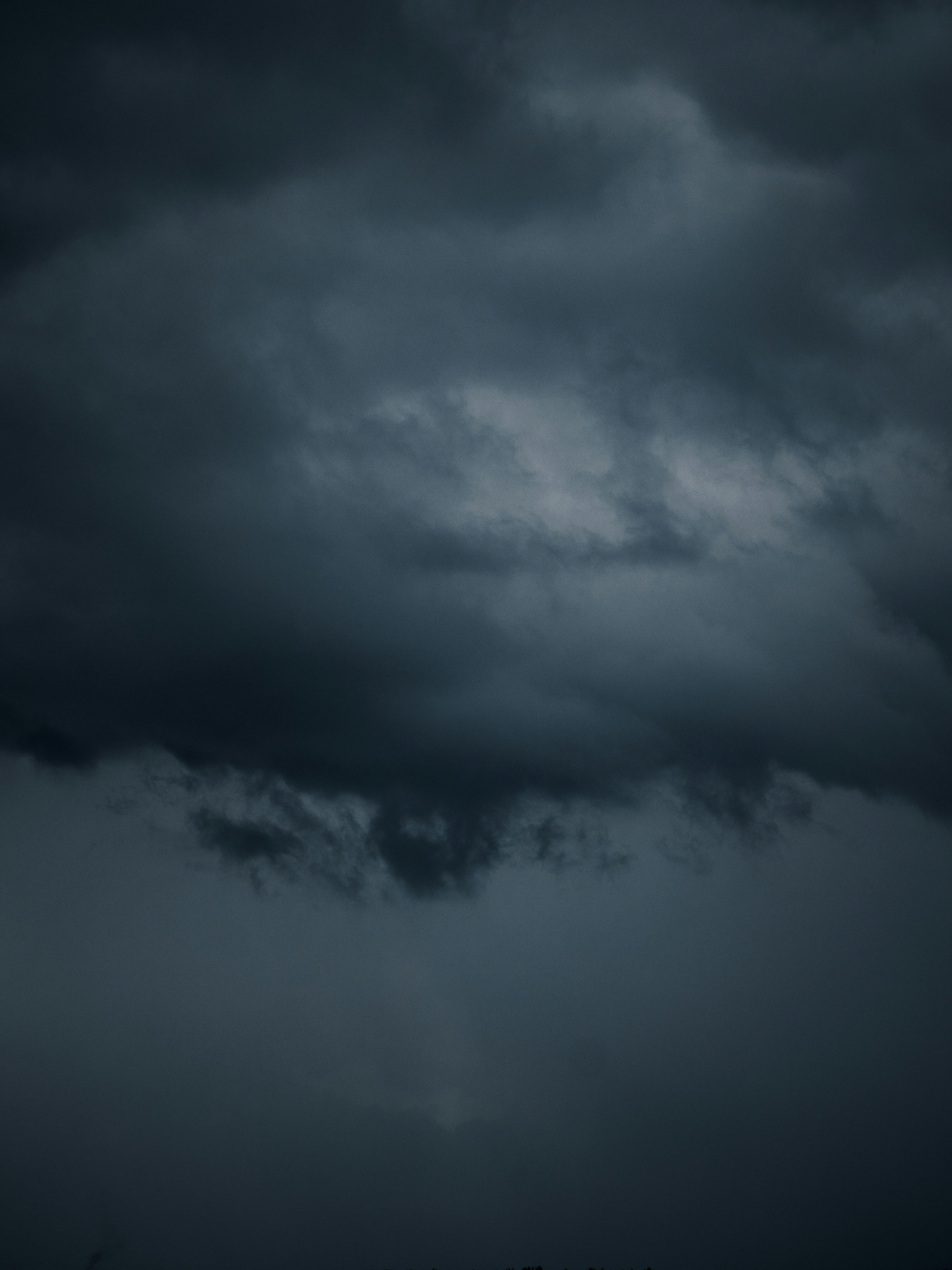 Shadowed Sky: A Moment Before the Thunder