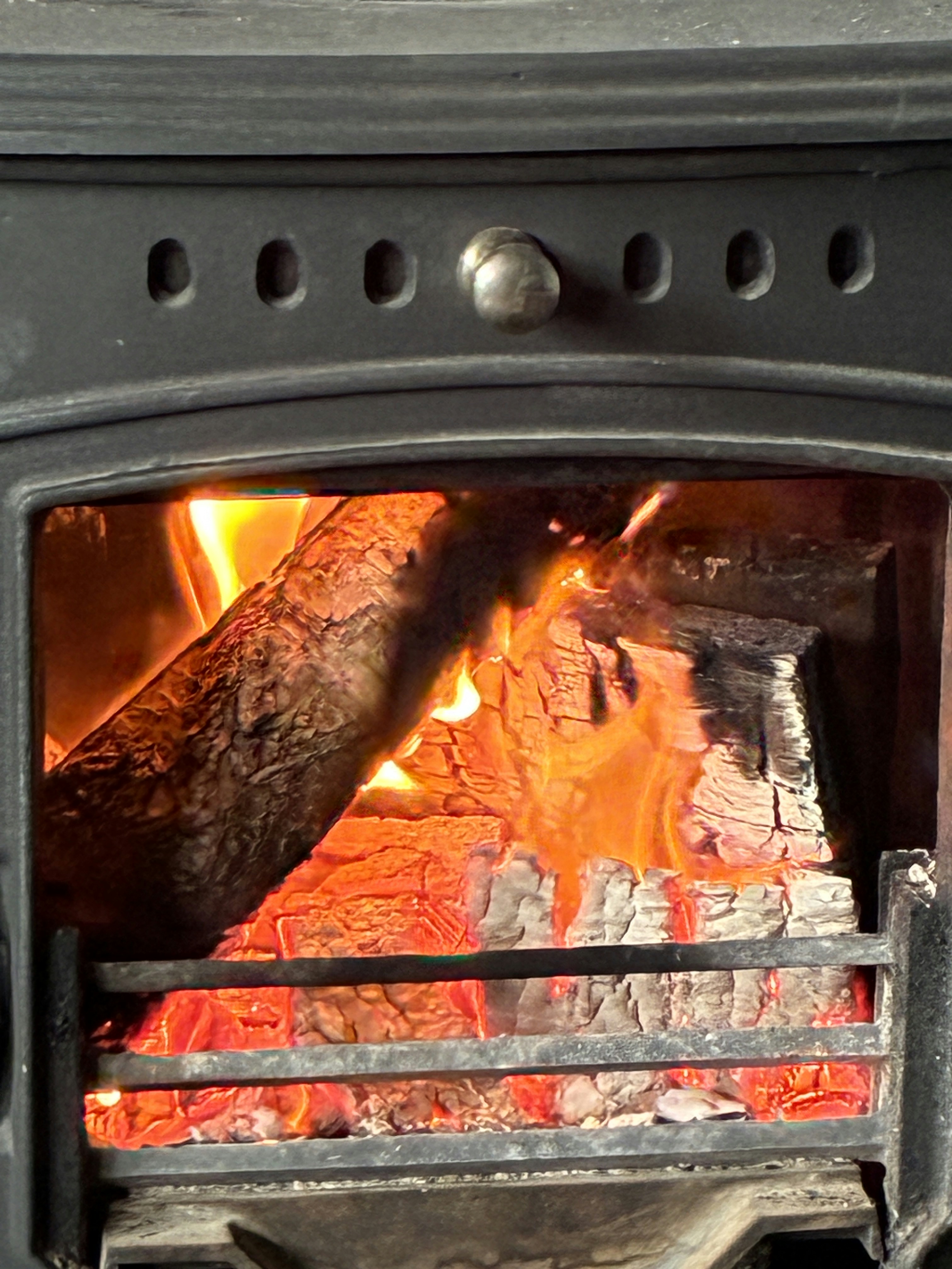 Warm Ember Portrait: Close-Up of a Cracking Fireplace