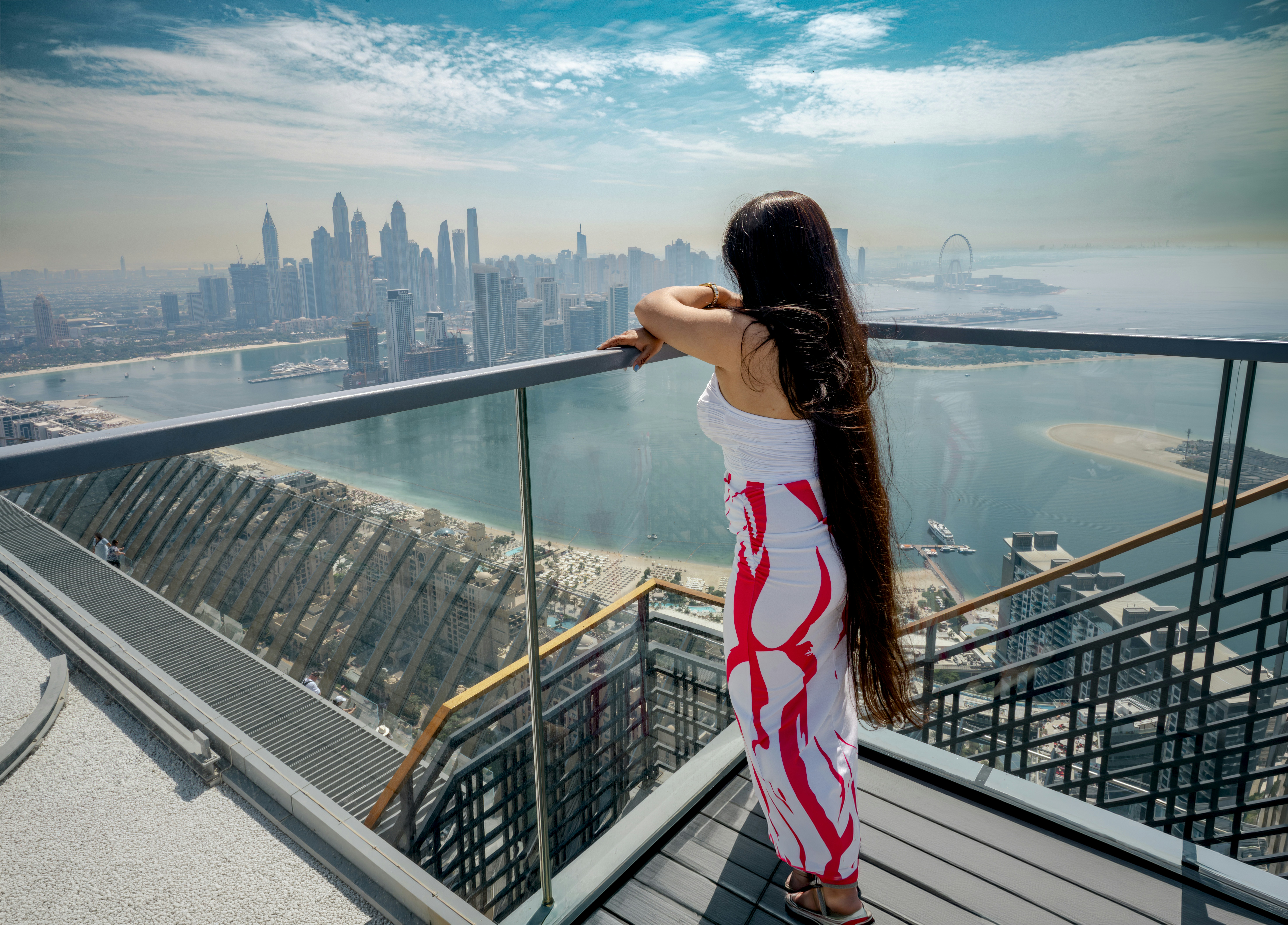 Watching the Golden City from the Glass Edge