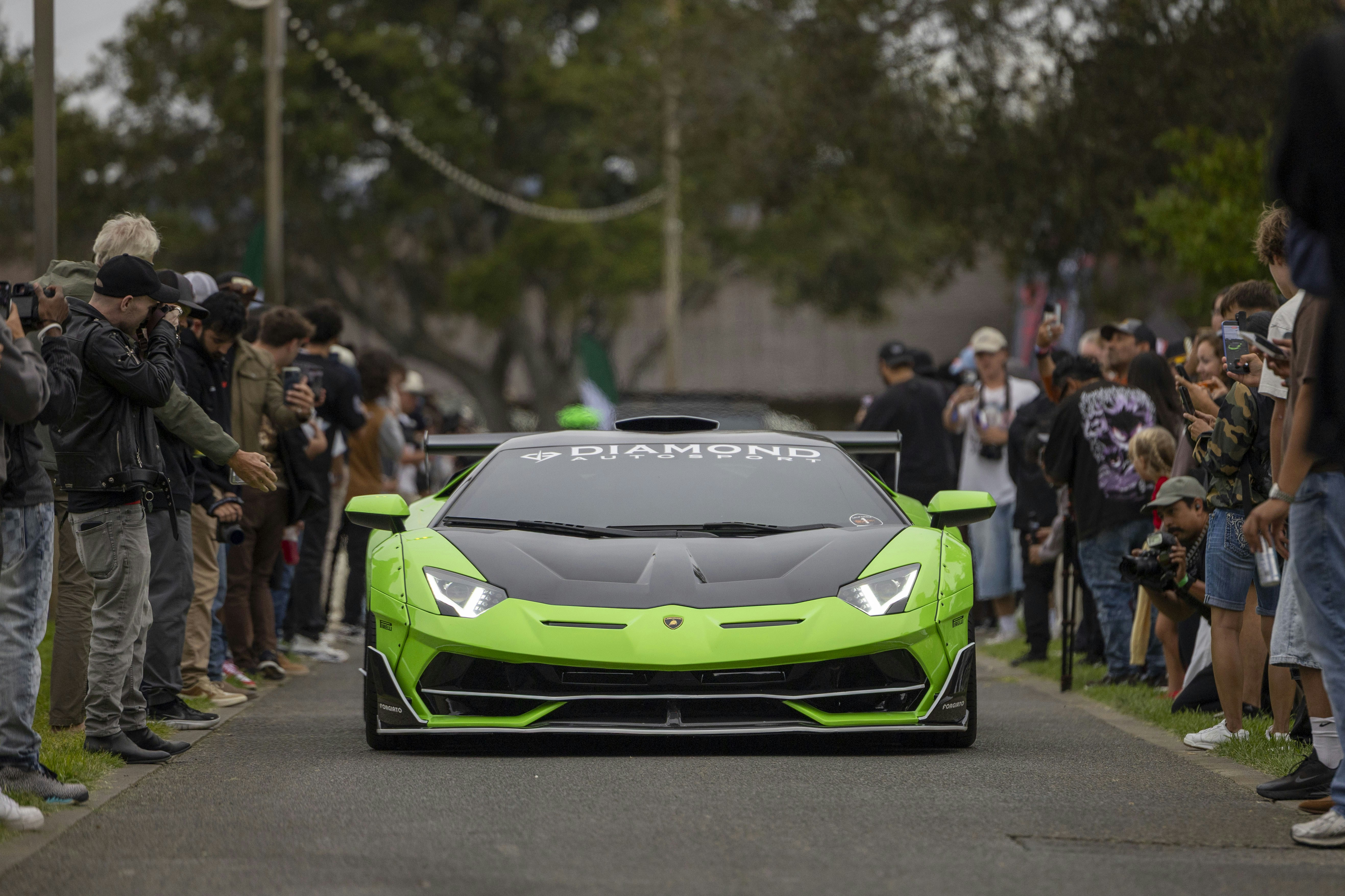 Lime-Lashed Bull: A Neon Lamborghini Leads the Streetline