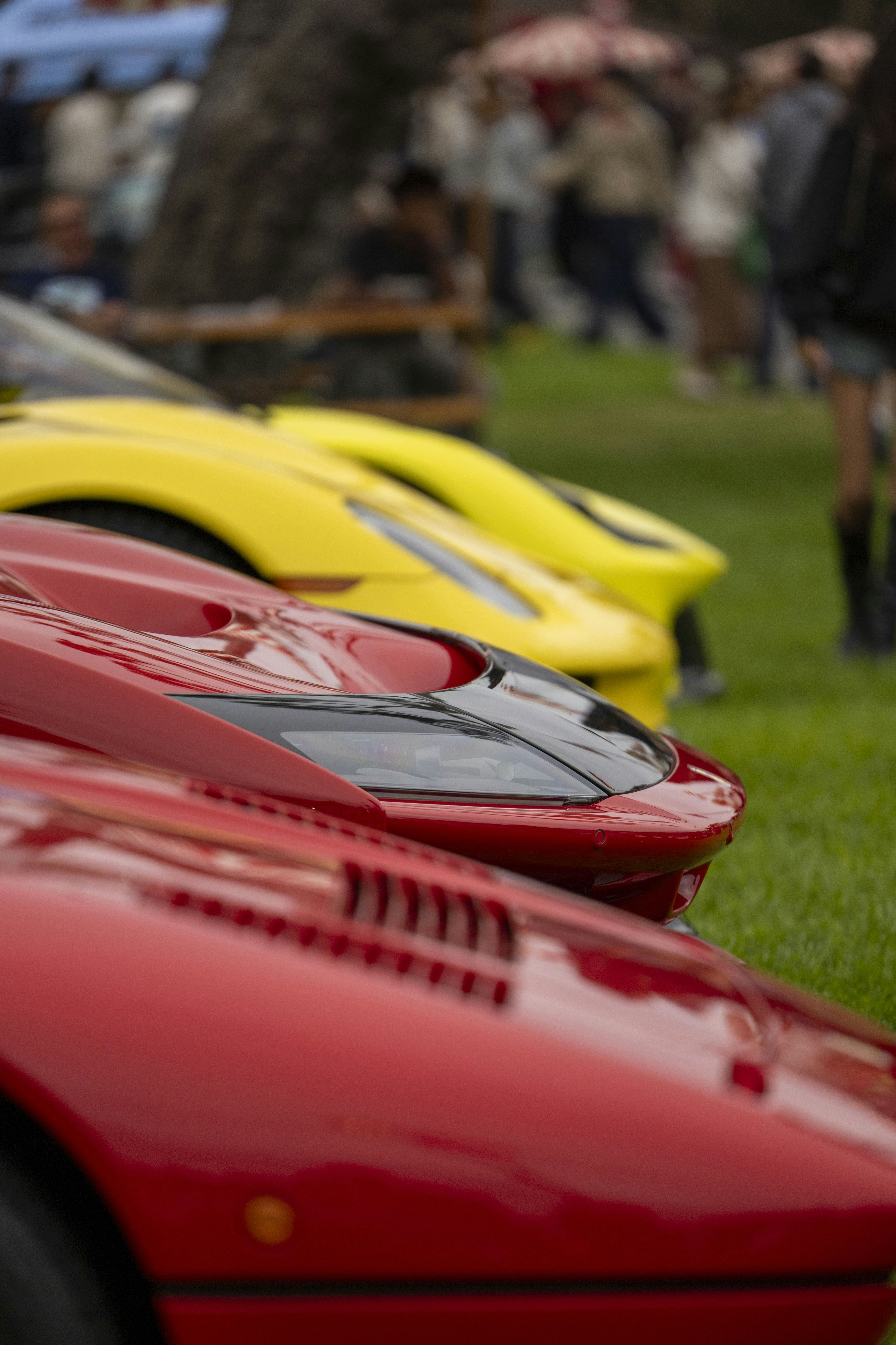 Lineup of Red, Yellow, and Gold: A Close-Down of Exotic Car Parade