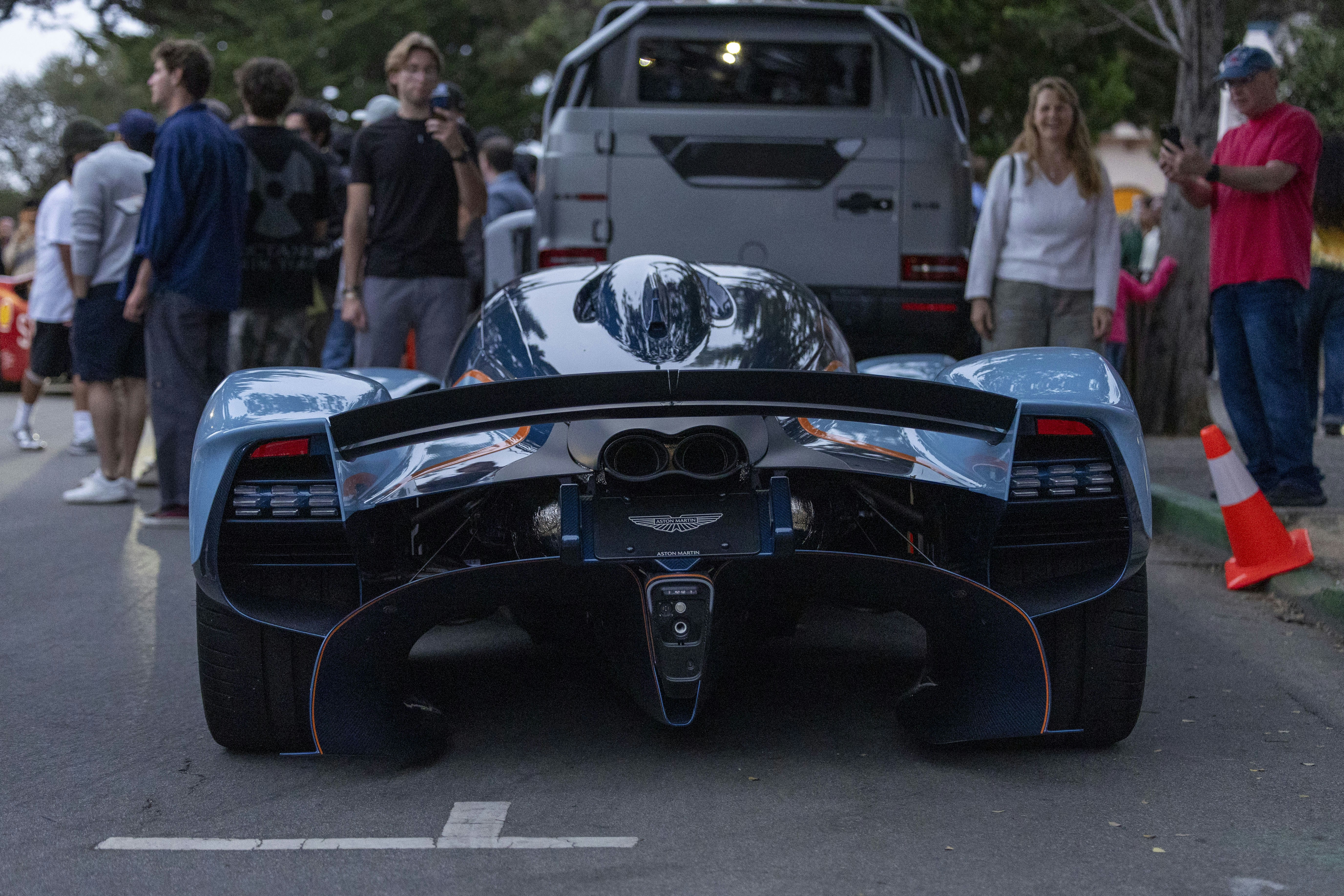 Backlit Velocity: The Blue Hypercar Resting at the Line