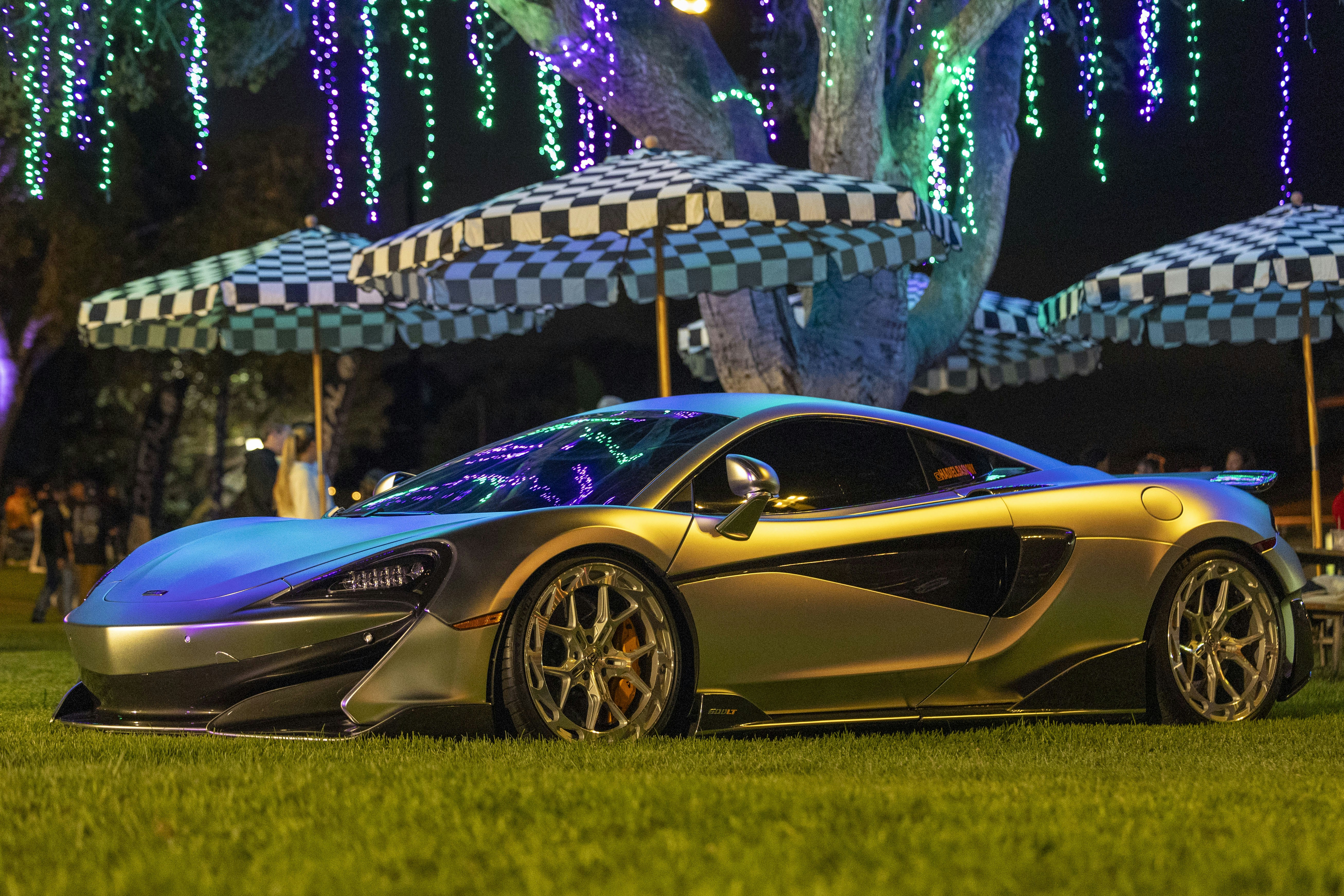 Midnight Velocity: A Silver Hypercar Under Neon Canopy
