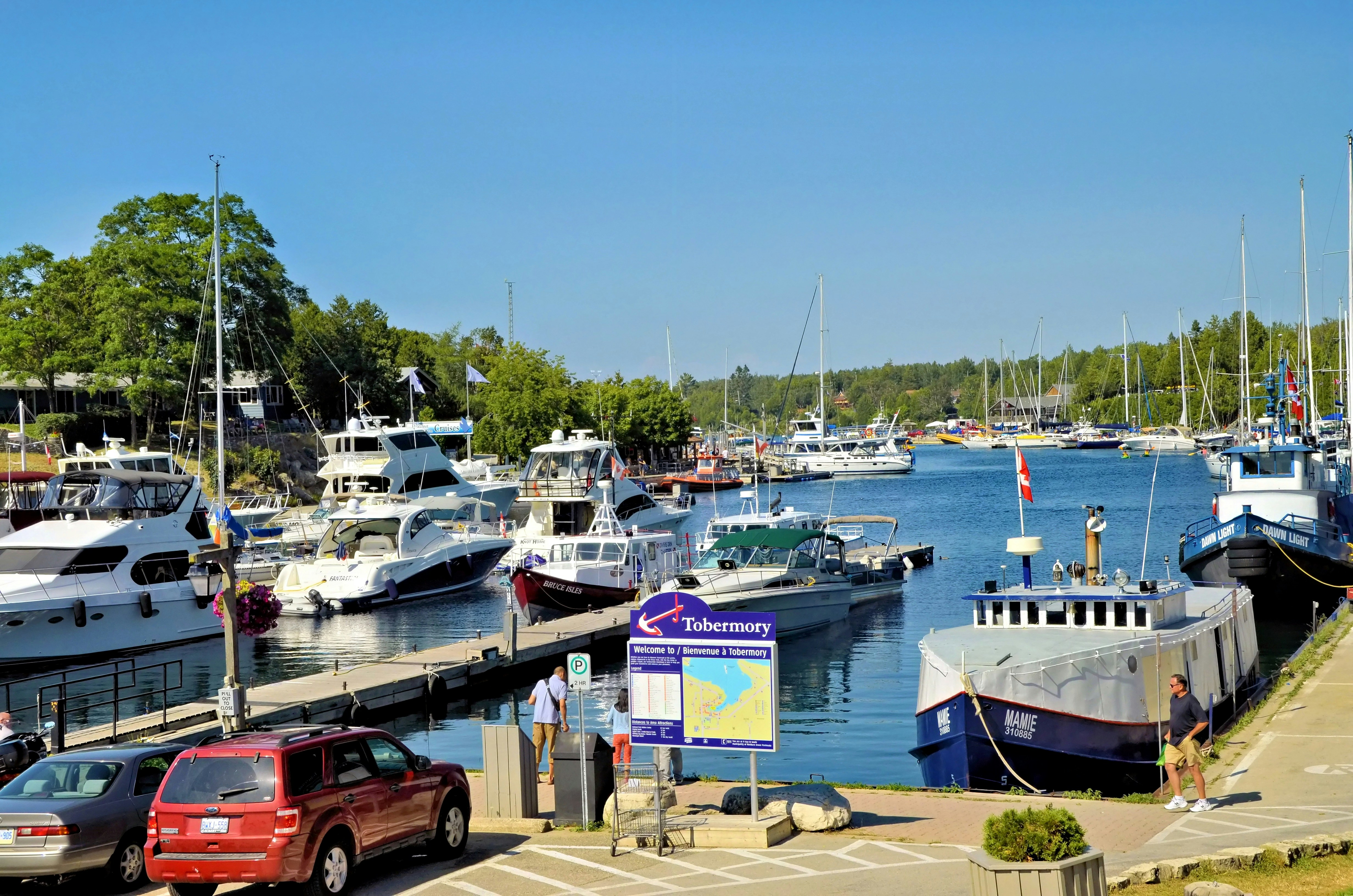 Harbor Mosaic: Boats, Dock, and Evening Calm
