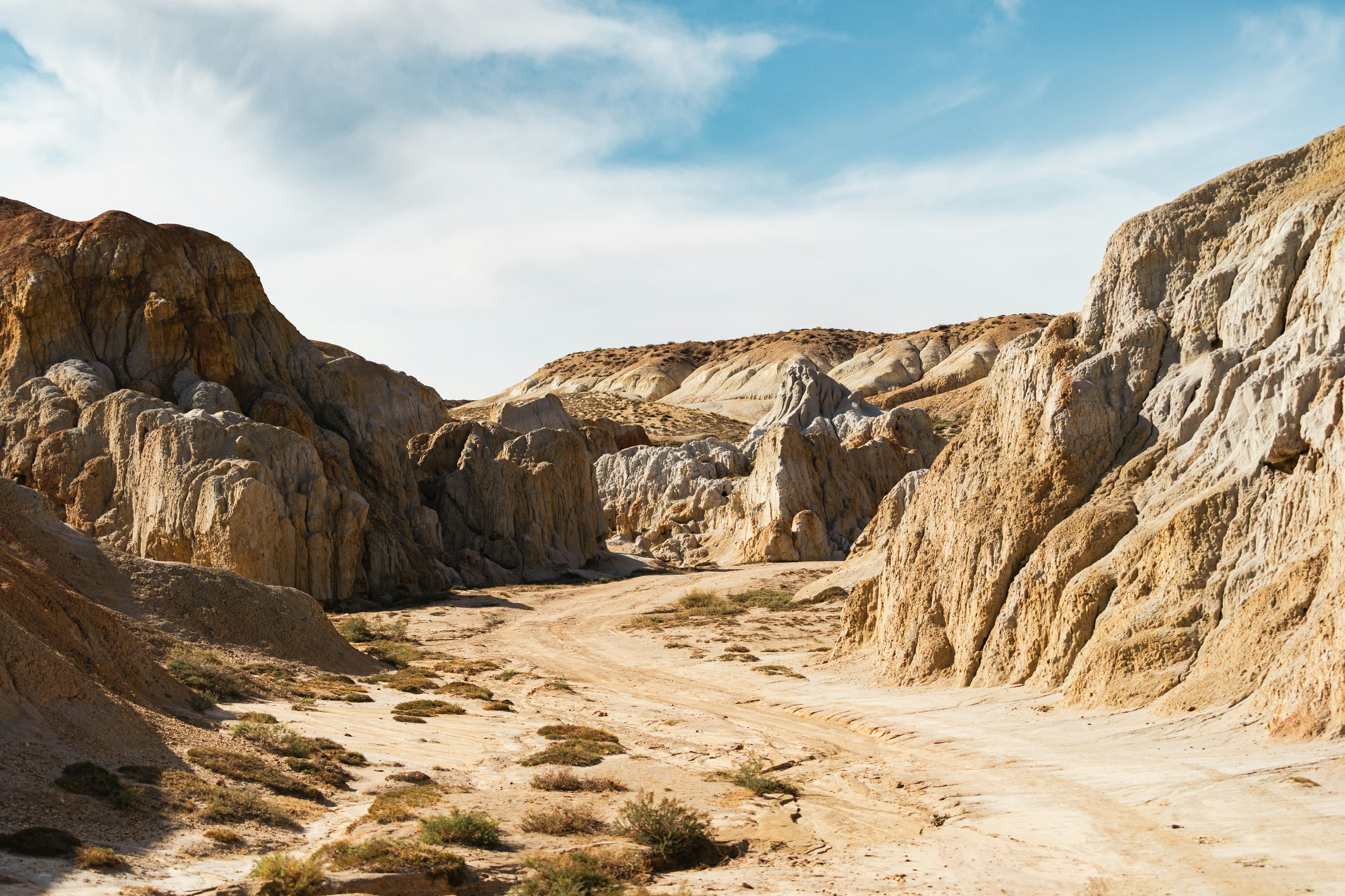 Dusty Canyon Pathway Between Weathered Cliffs