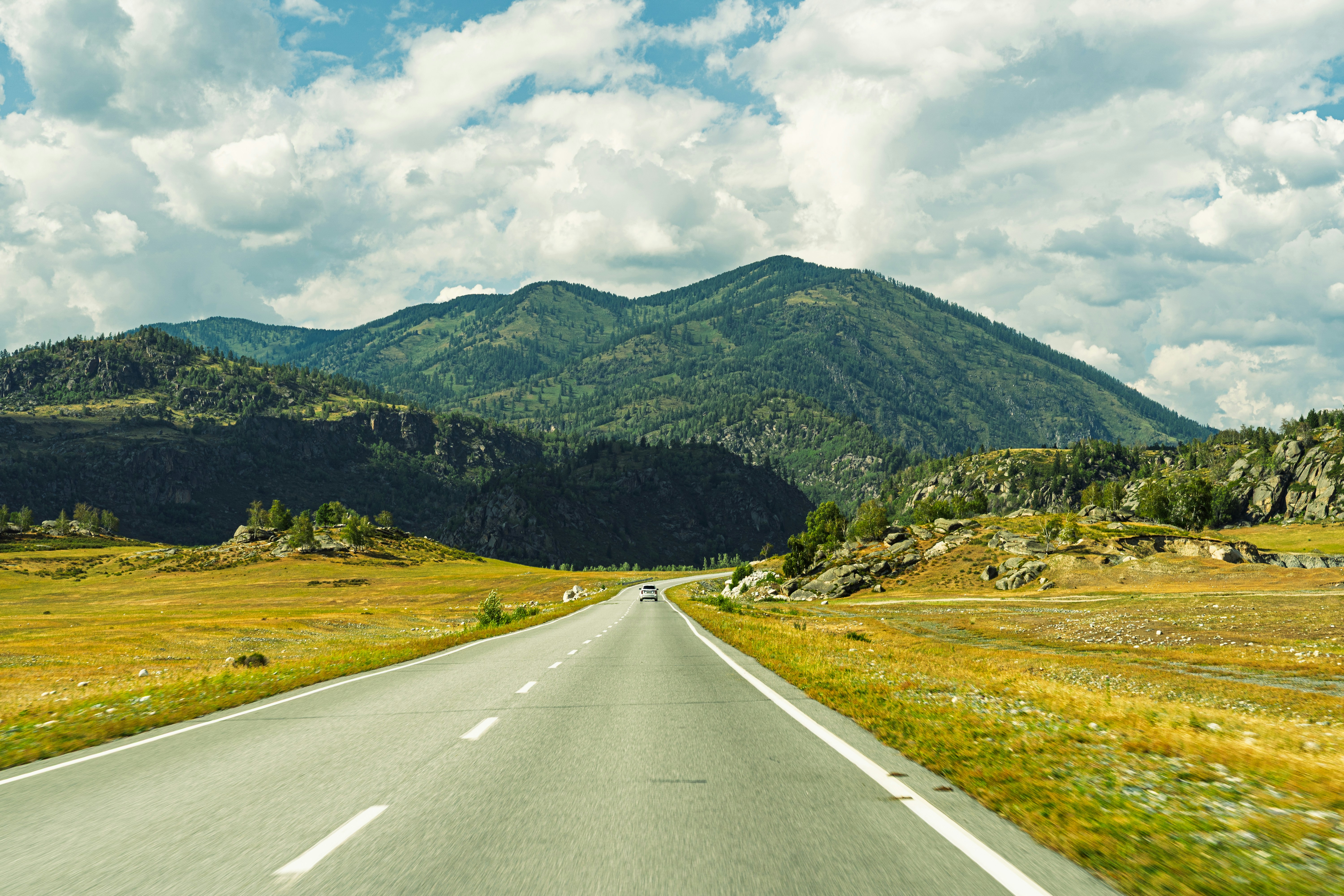 Open Highway Toward the Green-Crowned Peak